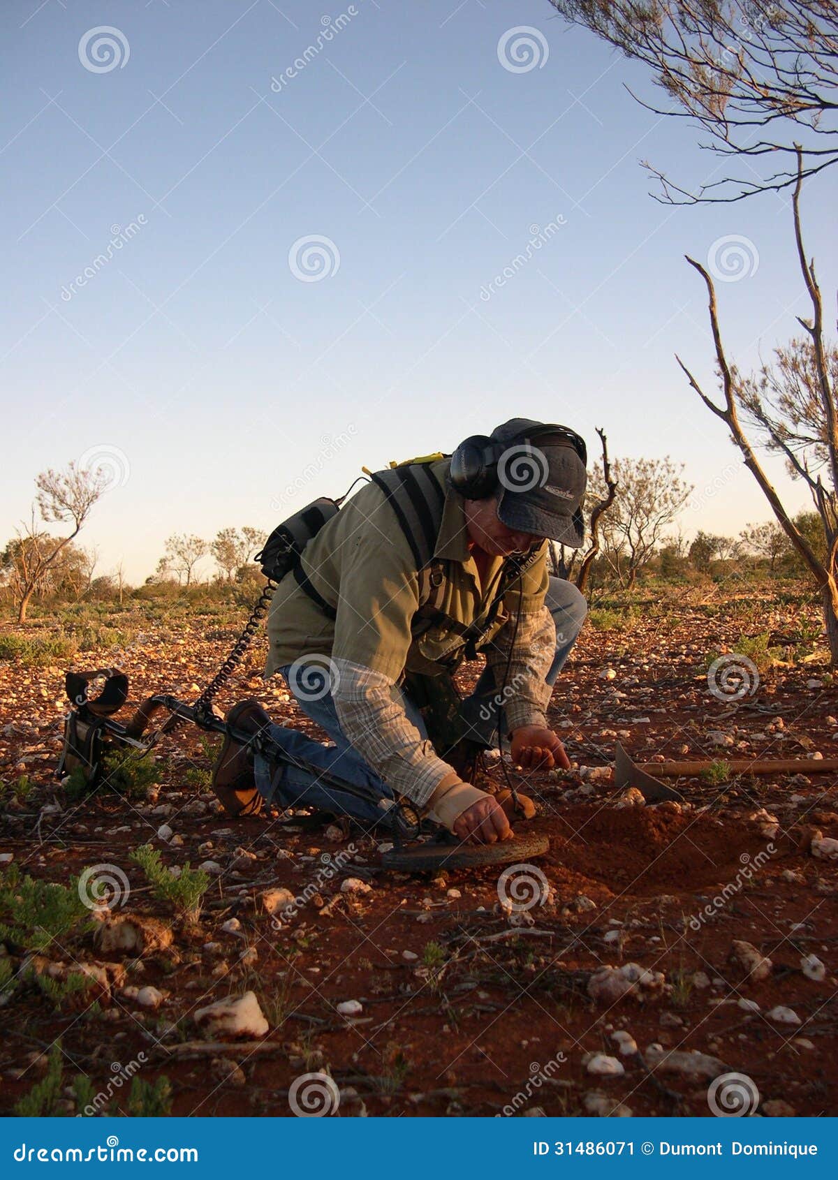 Women Using a Metal Detector Editorial Photo - Image of pick, stones ...