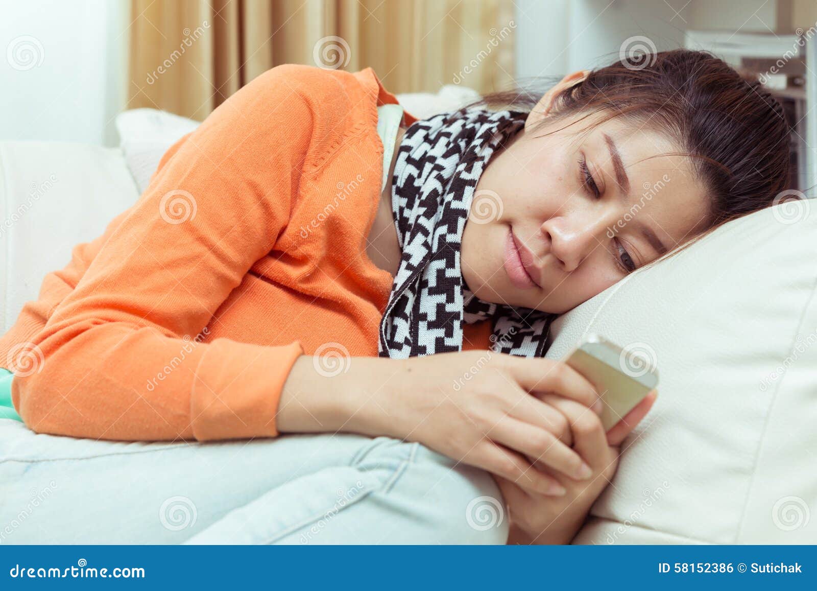 Women Using a Mobile Phone in Home with Reading Message Stock Photo ...