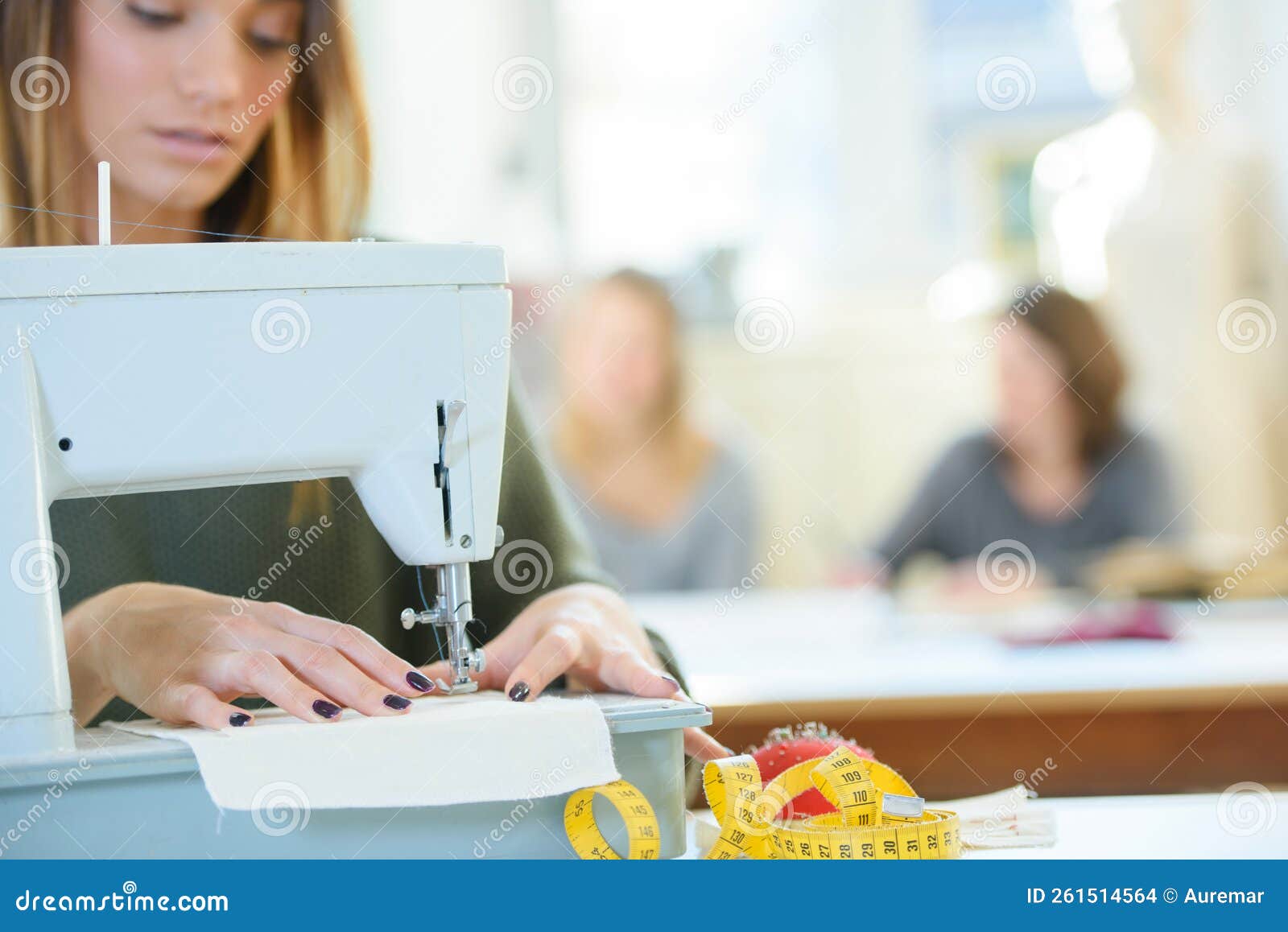 Women using sewing machine stock photo. Image of machinery - 261514564
