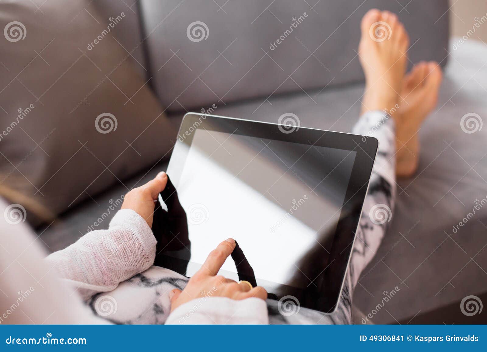 Women Using a Tablet Sitting on the Sofa Stock Image - Image of home ...