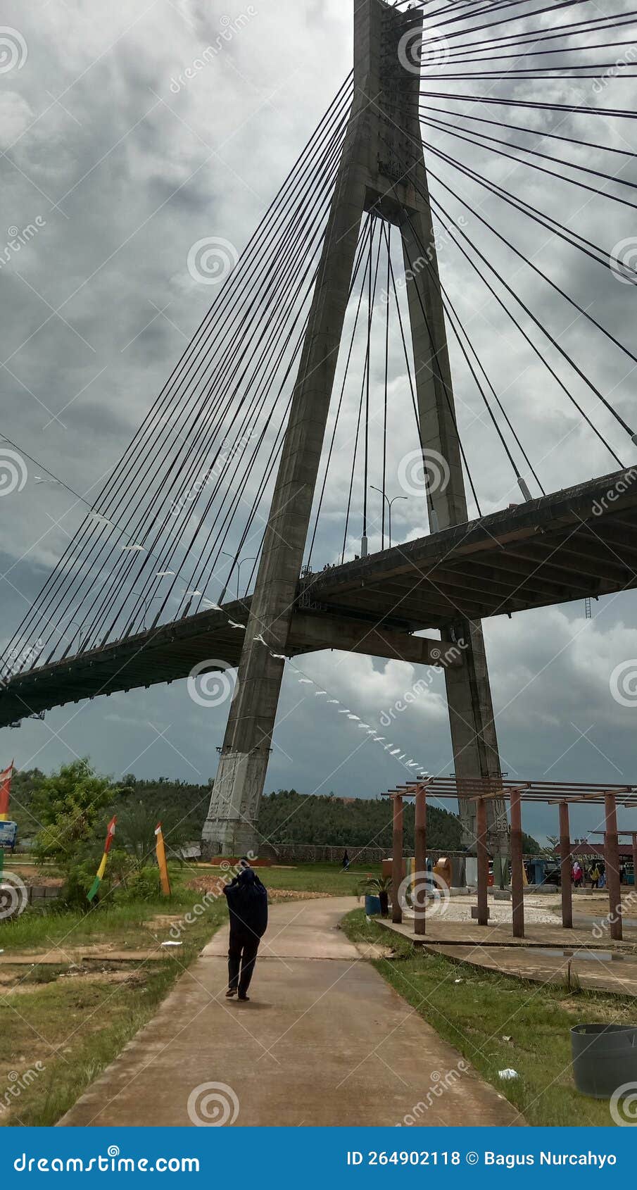 The Women Walk Under the Bridge Connecting 2 Islands Stock Photo ...