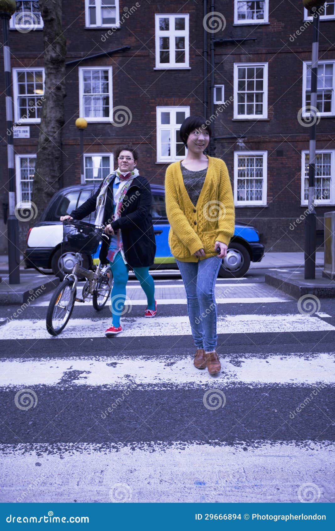 Women Walking Across a Cross-walk Stock Photo - Image of female ...