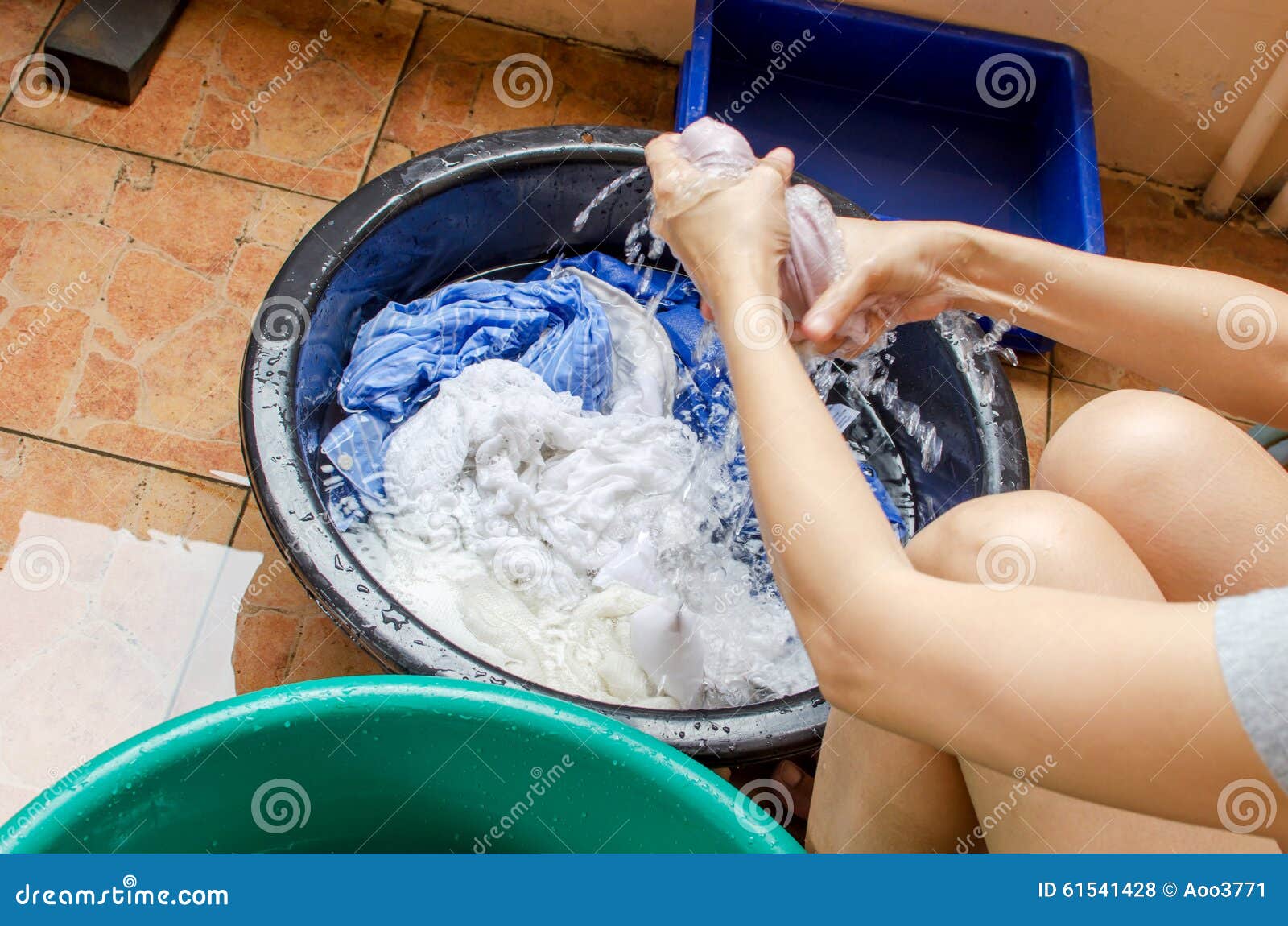 Women washing clothes stock photo. Image of background - 61541428
