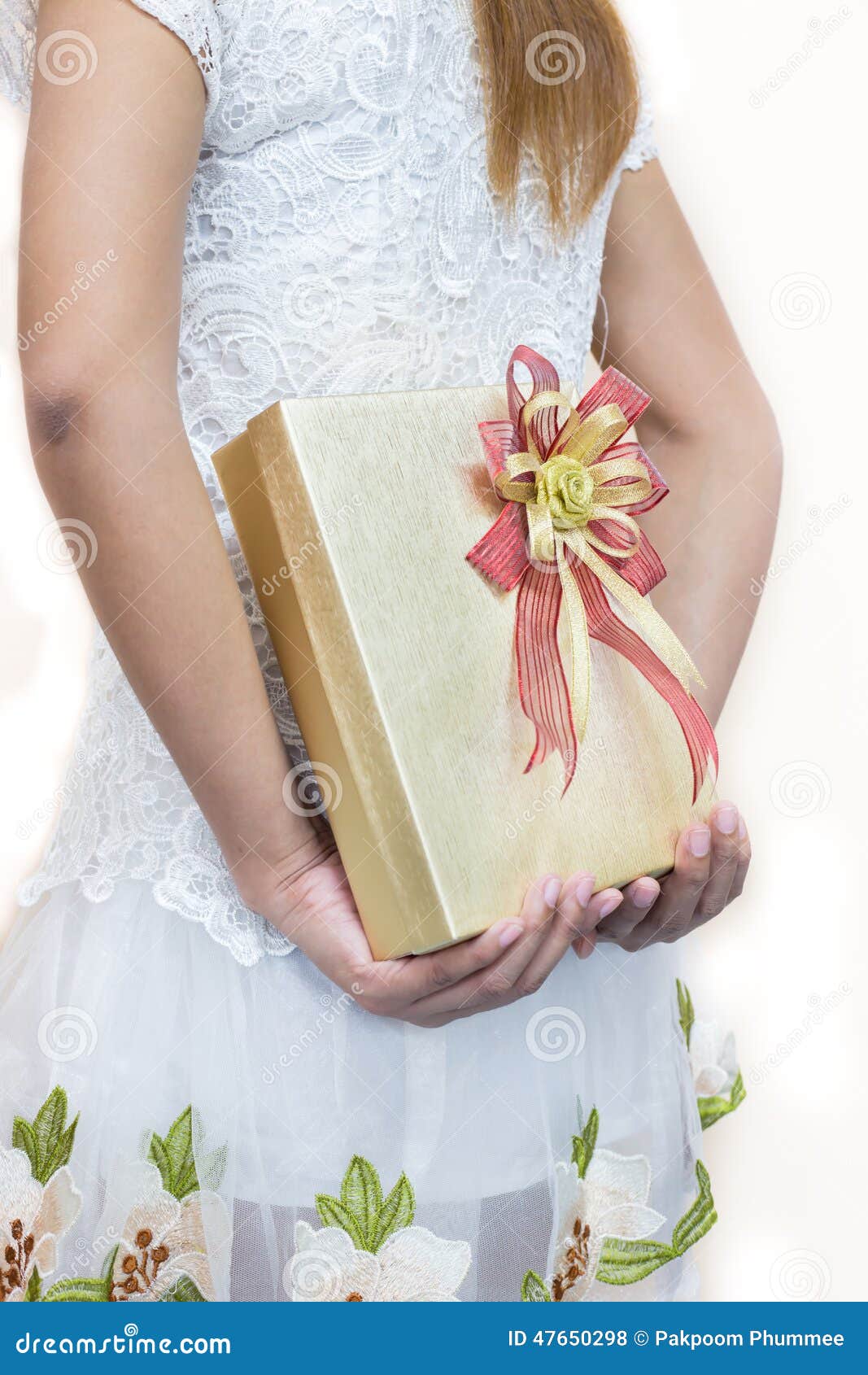 Women in White Hiding a Gift Behind Her Back. Stock Photo - Image of ...