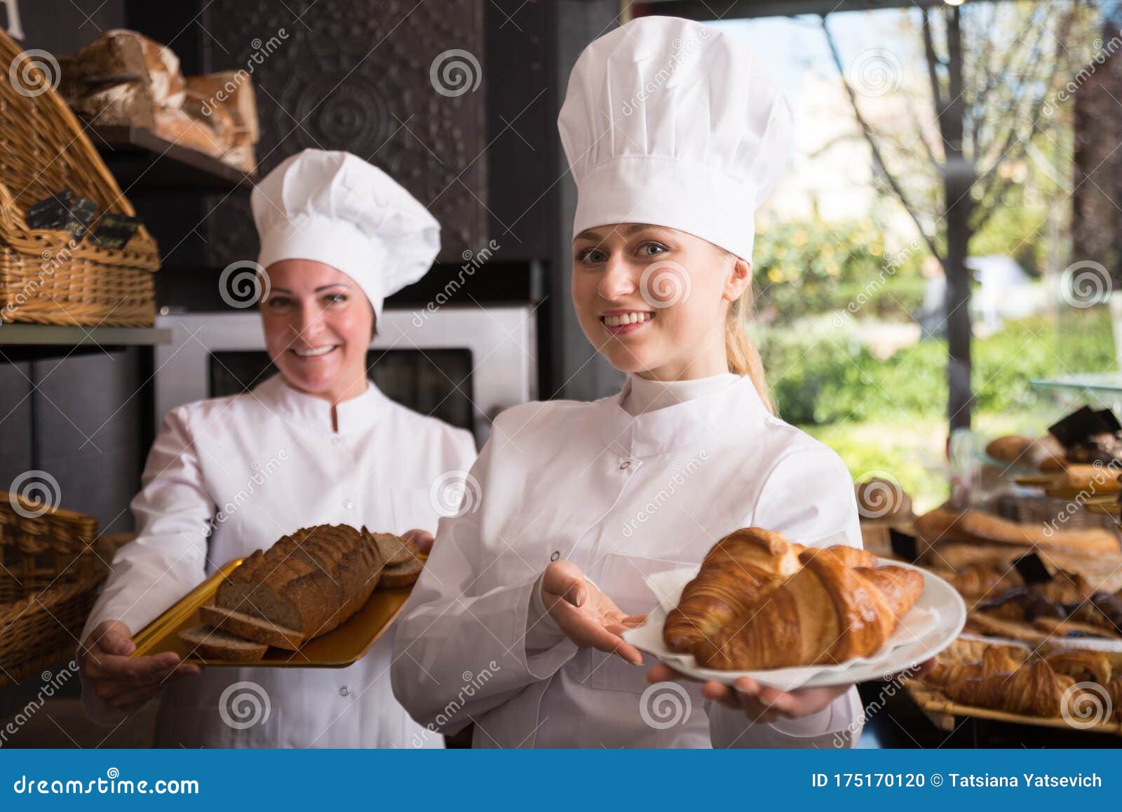 Women Workers in a Bakery Posing with Pastries Stock Photo - Image of ...