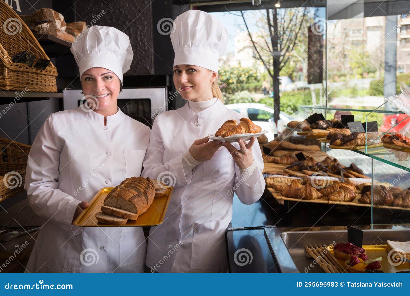 Women Workers in a Bakery Posing with Pastries Stock Image - Image of ...