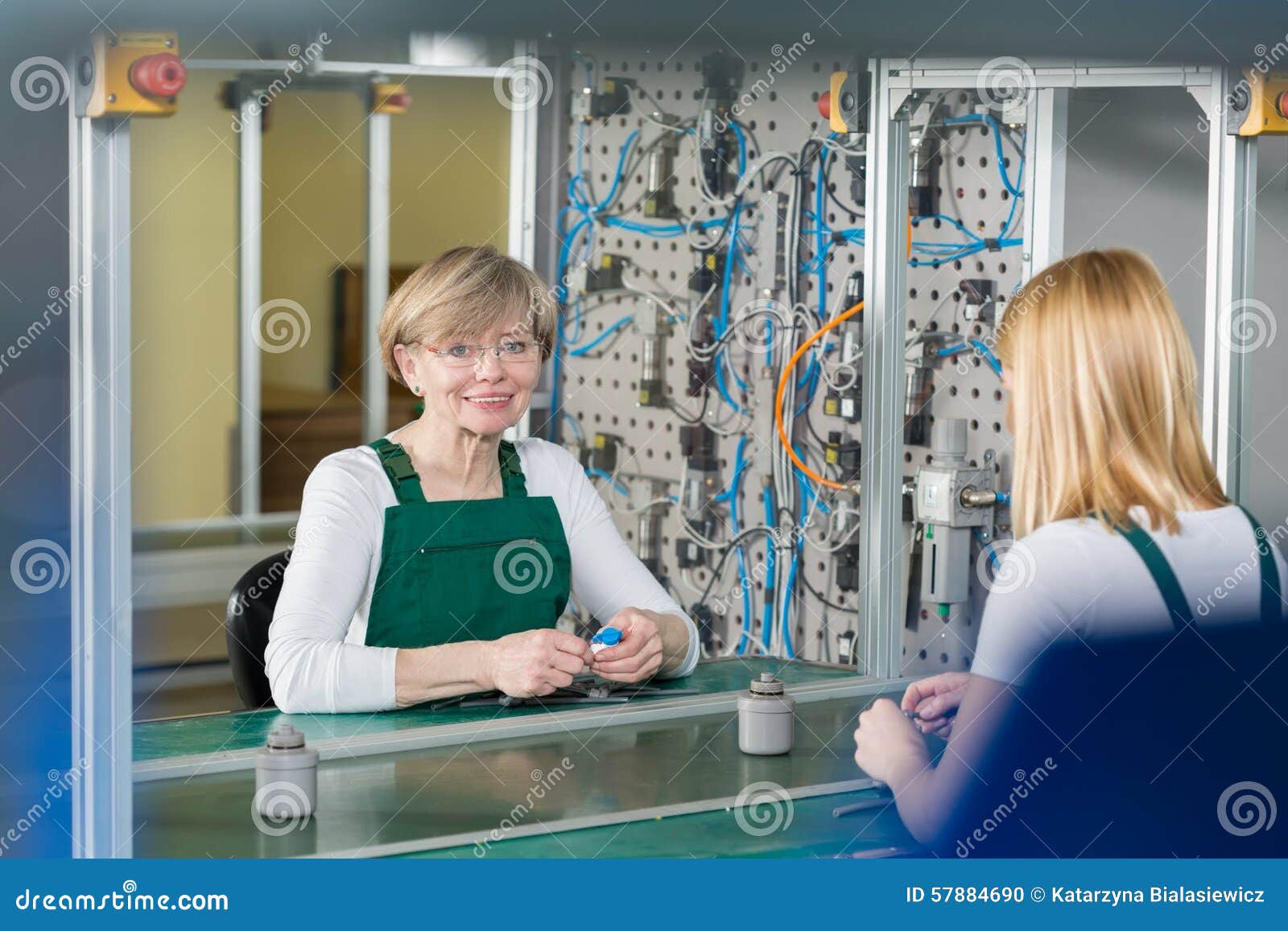Women Working on Assembly Line Stock Photo - Image of electronic ...
