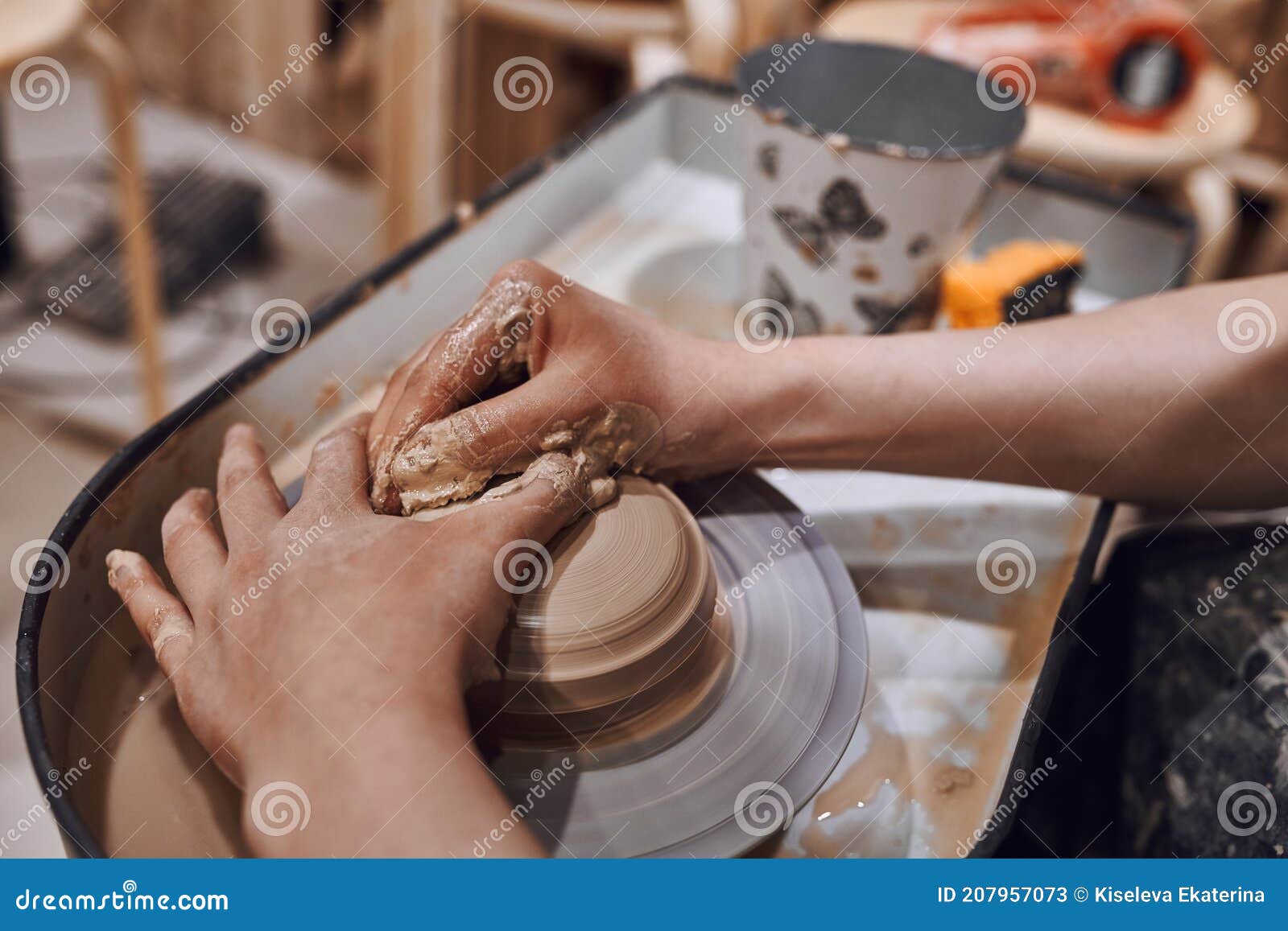 Women Working on Potters Wheel Making Clay Objects in Pottery Workshop ...