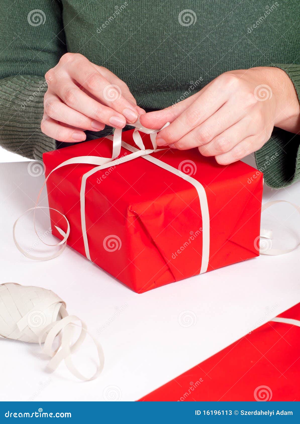 Women wrapping gitf box stock image. Image of young, shot - 16196113