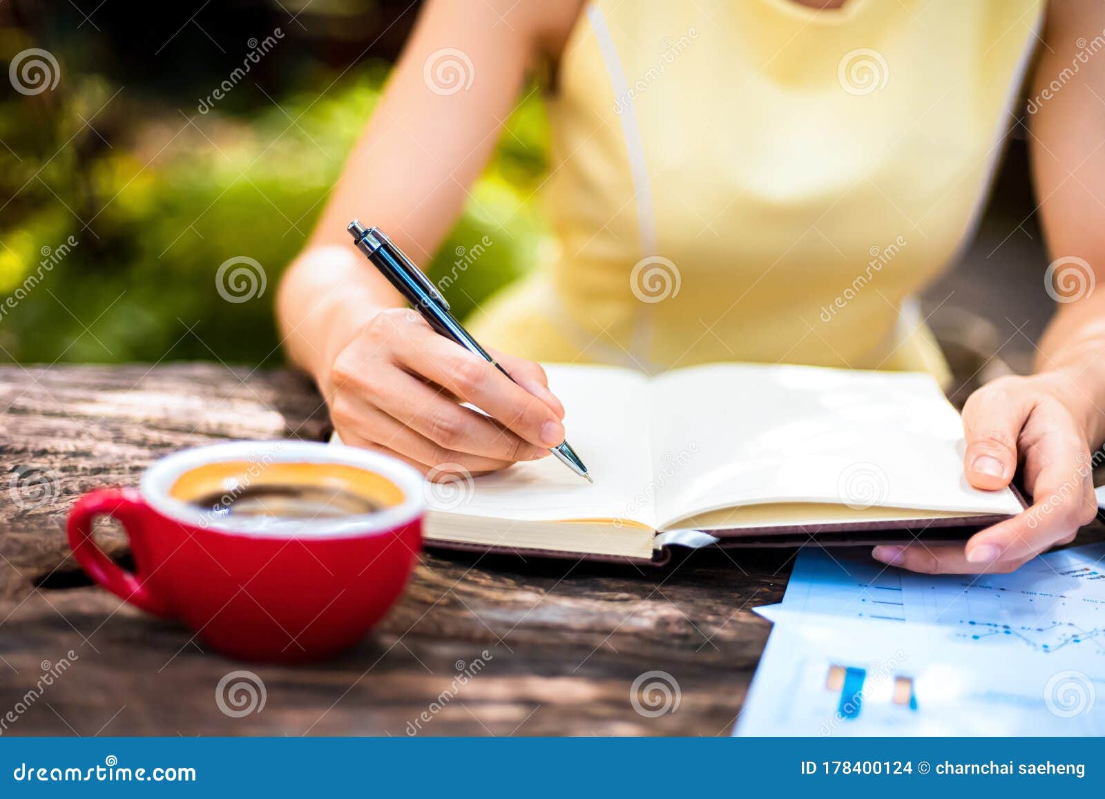 Women Writing Note Book on the Table Stock Photo - Image of graph ...