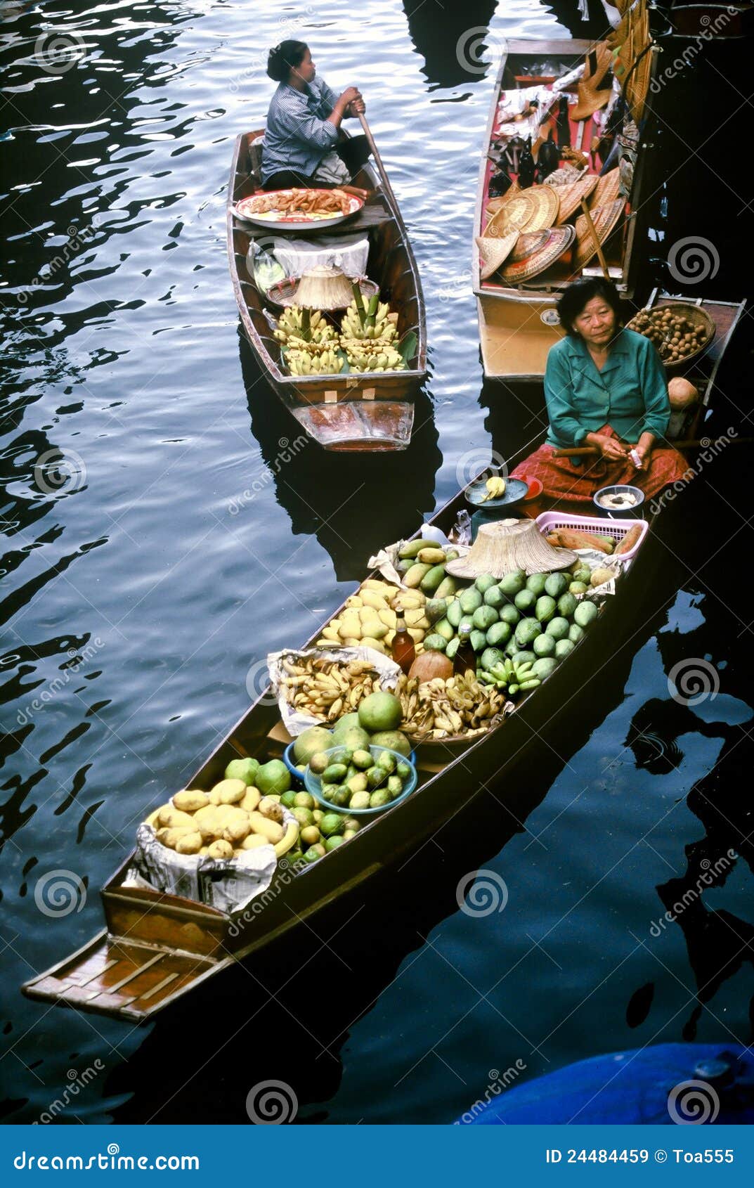 Womenn on fruit boat editorial stock image. Image of busy - 24484459