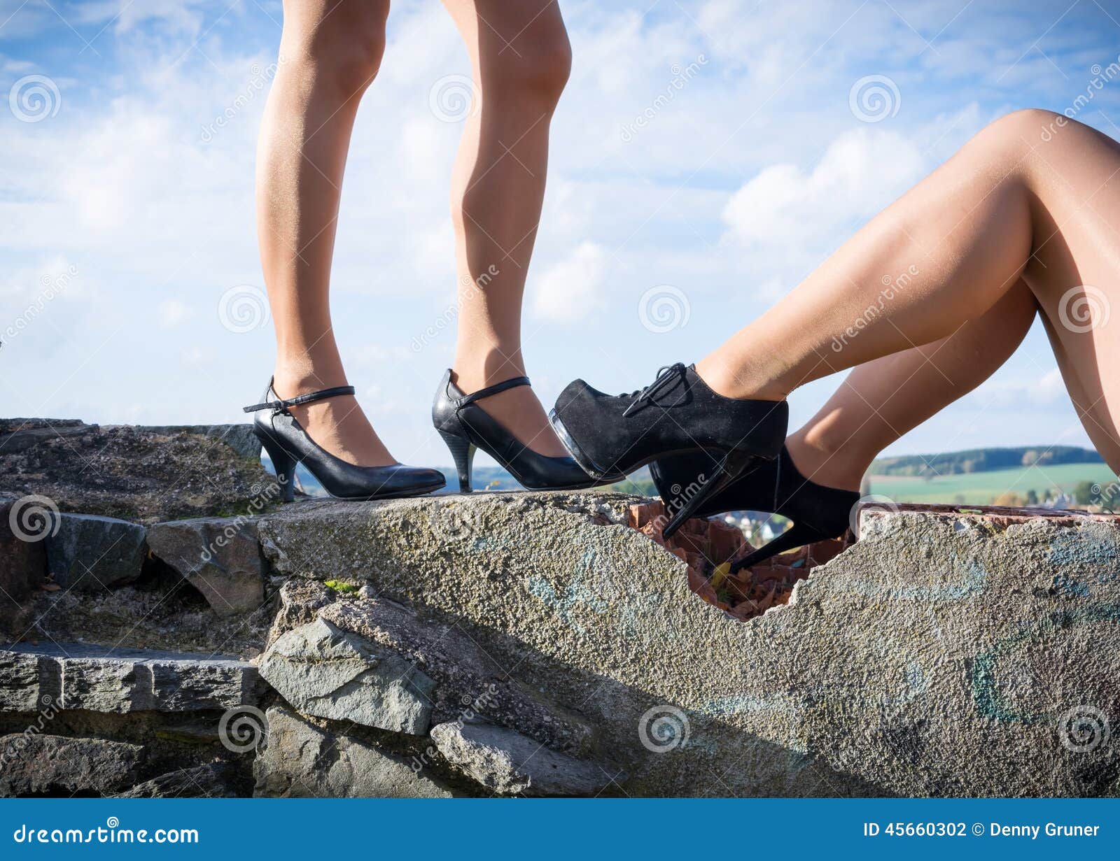 Womens legs on a wall stock photo. Image of footwear - 45660302