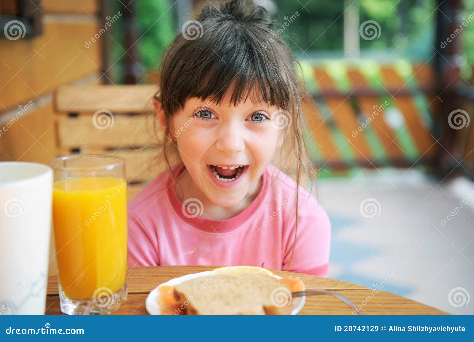 Wondered Child Girl Has a Breakfast Outdoors Stock Image - Image of ...
