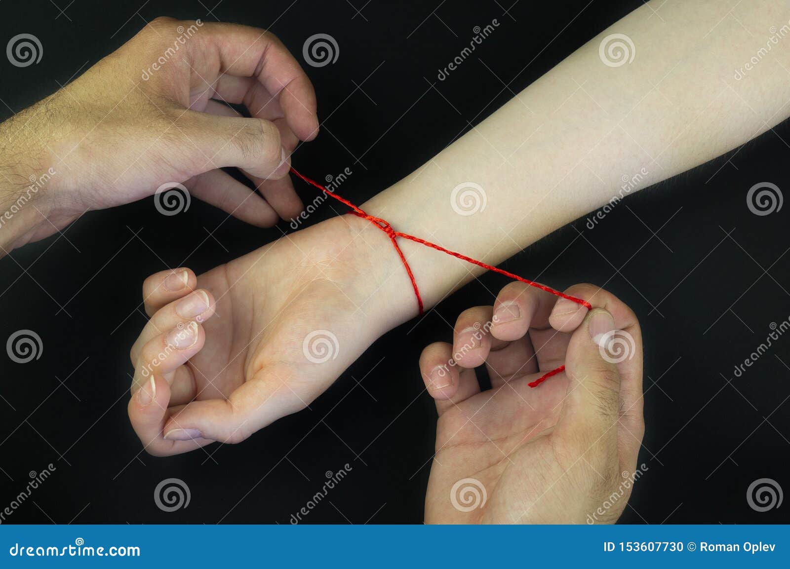 Wonderful Red Thread on a Black Background in the Cart Stock Photo ...