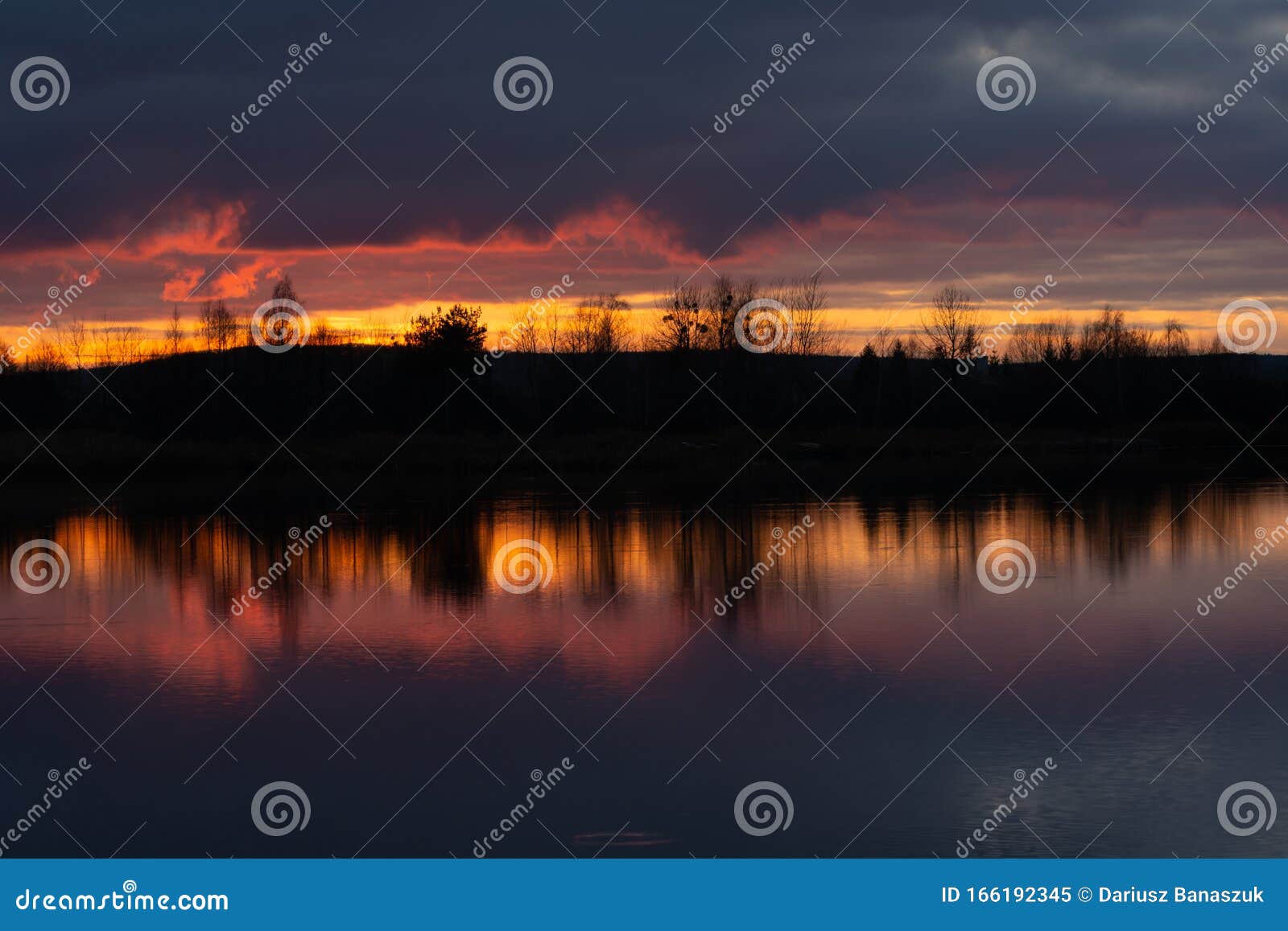 Wonderful Sunset Over the Water, Colorful Clouds and the Reflection of ...