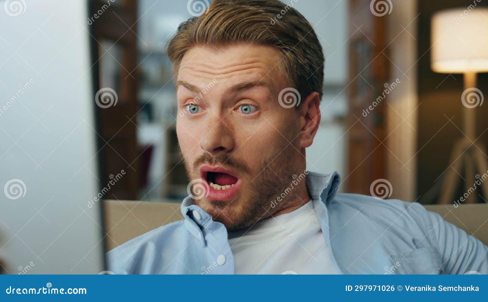 Wondering Man Surprised Face Reading Tablet Closeup. Guy Watching Tab ...