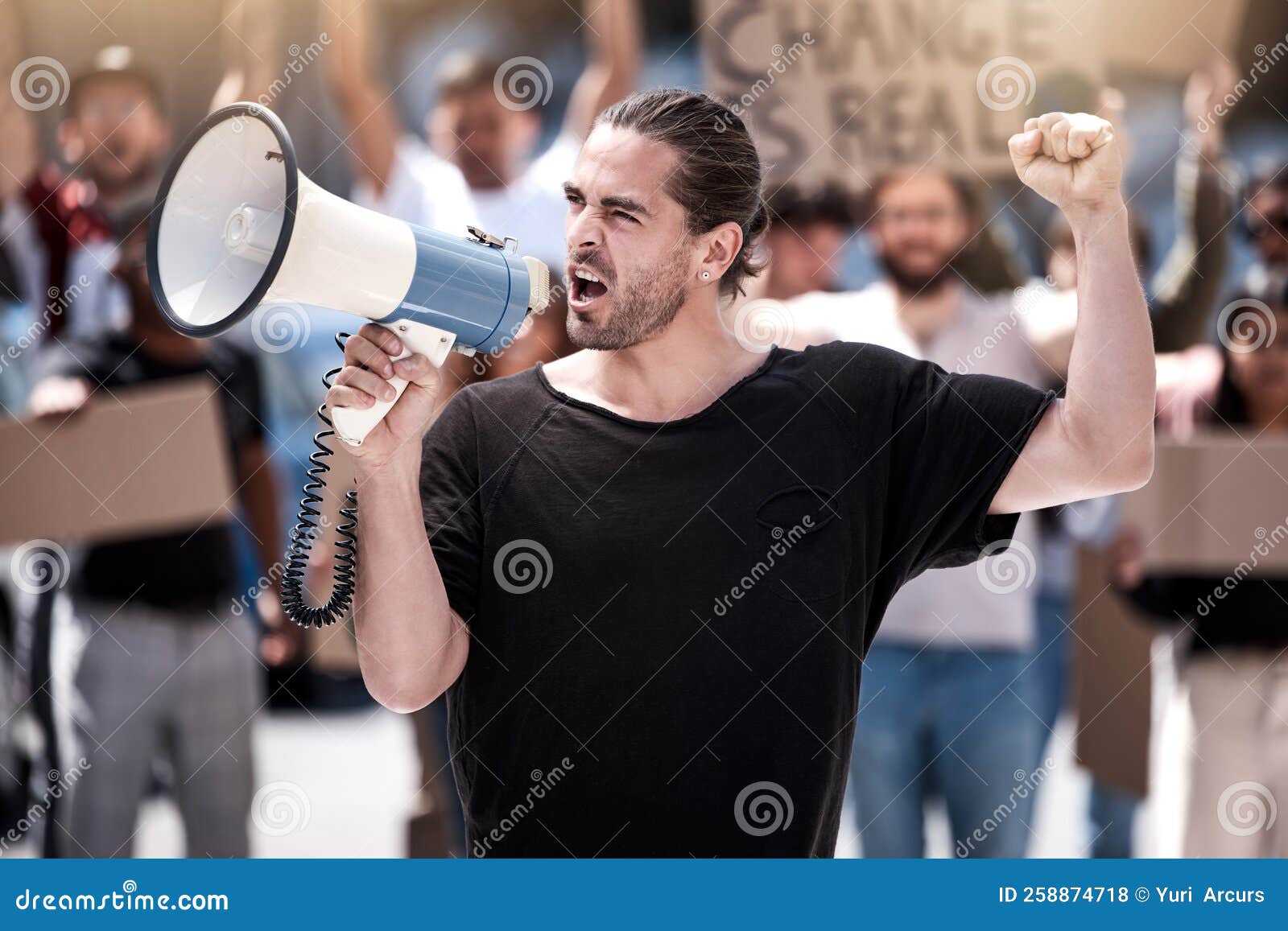 We Wont Back Down. a Young Man Yelling through a Megaphone during a ...
