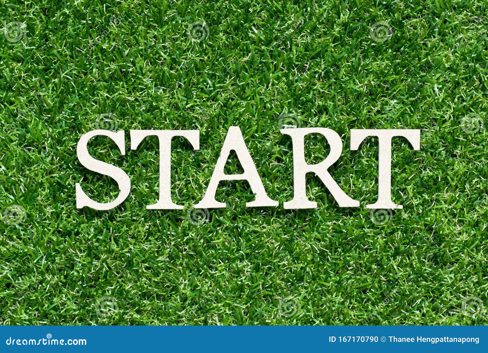 Wood Alphabet in Word Start on Artificial Green Grass Background Stock ...