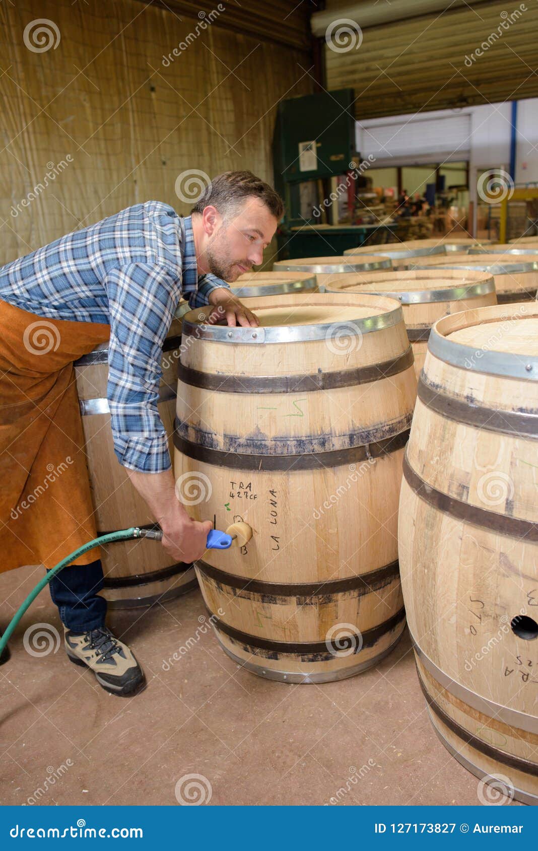 Wood Barrels Production Cooper Using Hammer and Tools in Workshop Stock ...