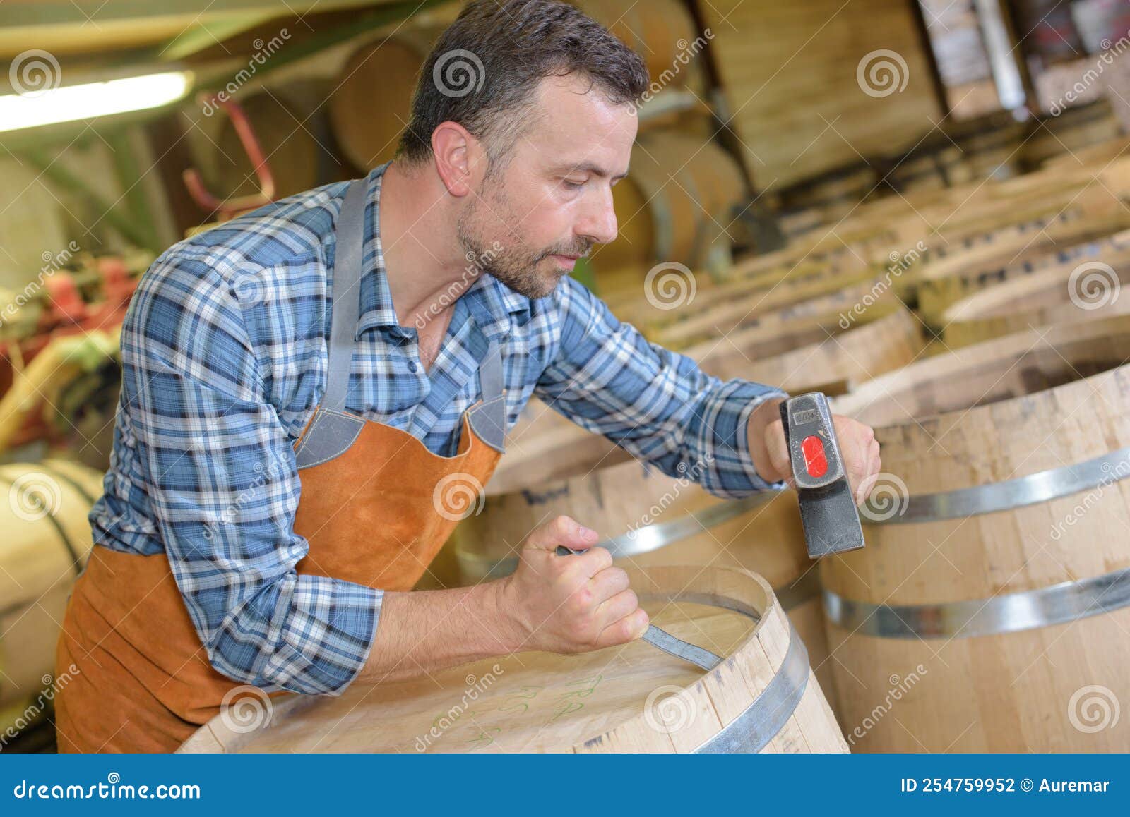 Wood Barrels Production Cooper Using Hammer and Tools in Workshop Stock ...
