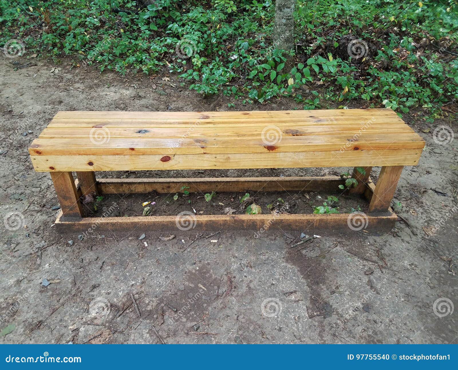Wood bench on the ground stock photo. Image of outdoor - 97755540