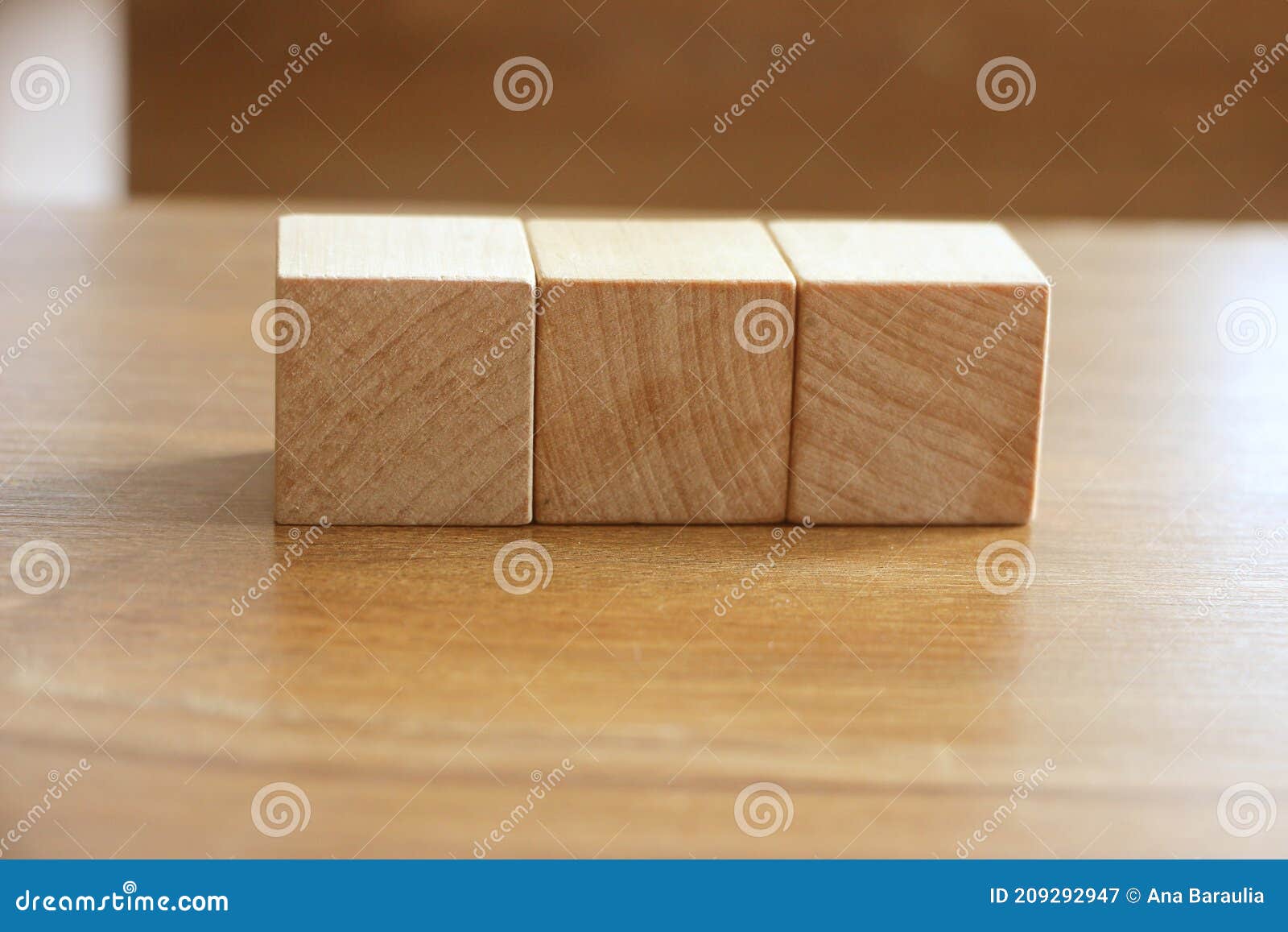 3 Wood Blocks Front View, on Wooden Table, Polished Wooden Table ...