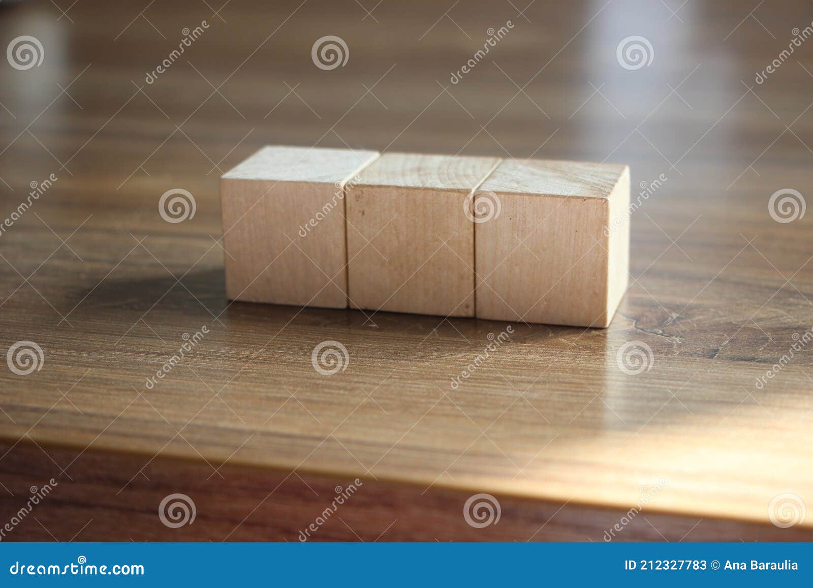 3 Wood Blocks Front View, on Wooden Table, Polished Wooden Table ...