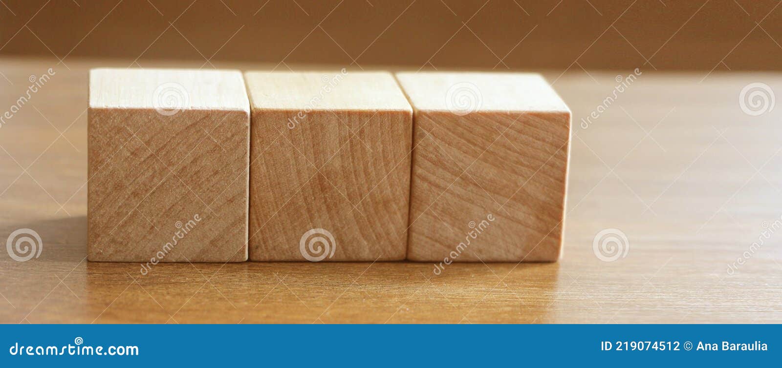 3 Wood Blocks Front View, on Wooden Table, Polished Wooden Table ...