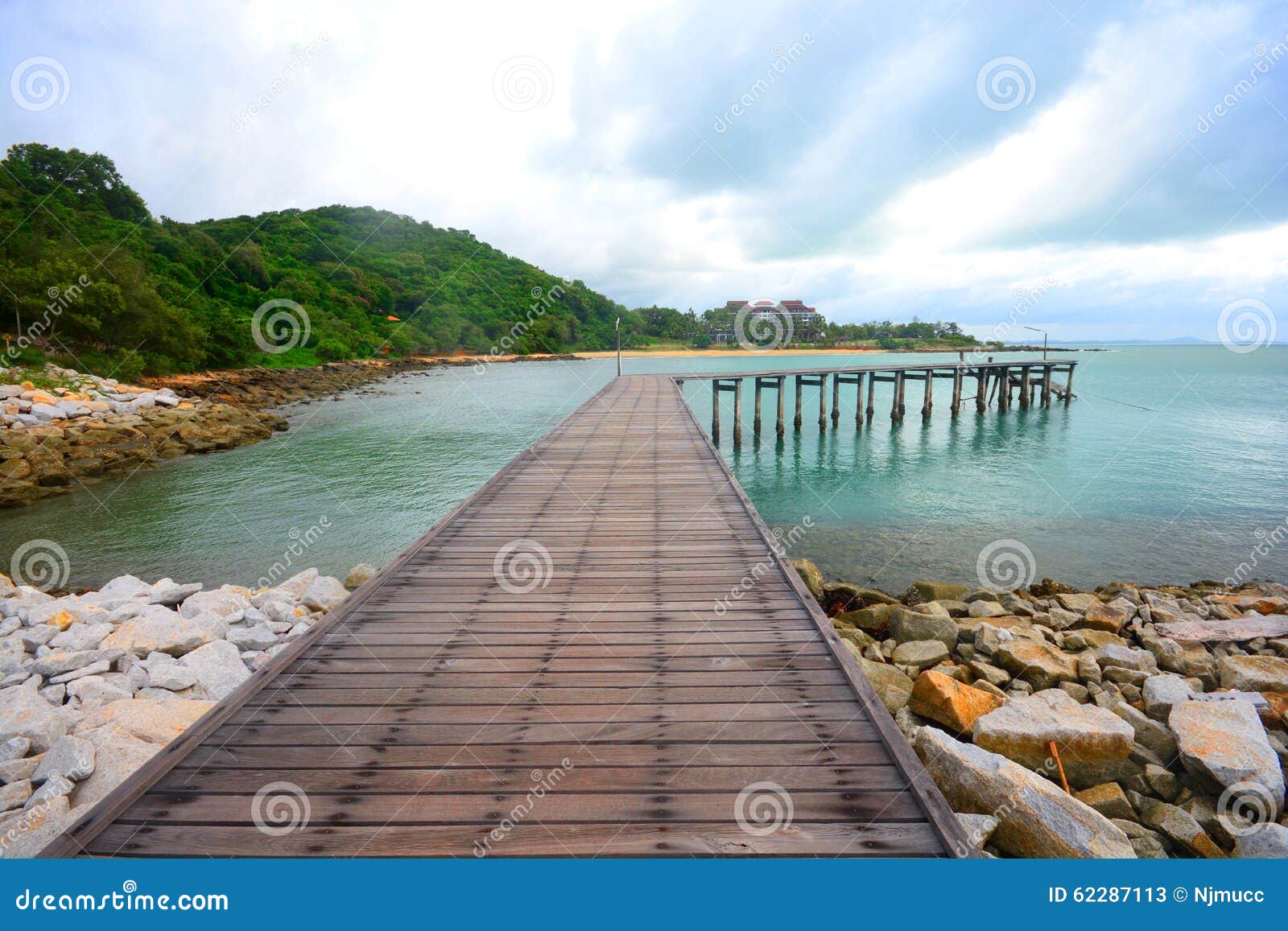 Wood bridge over the sea stock image. Image of beach - 62287113