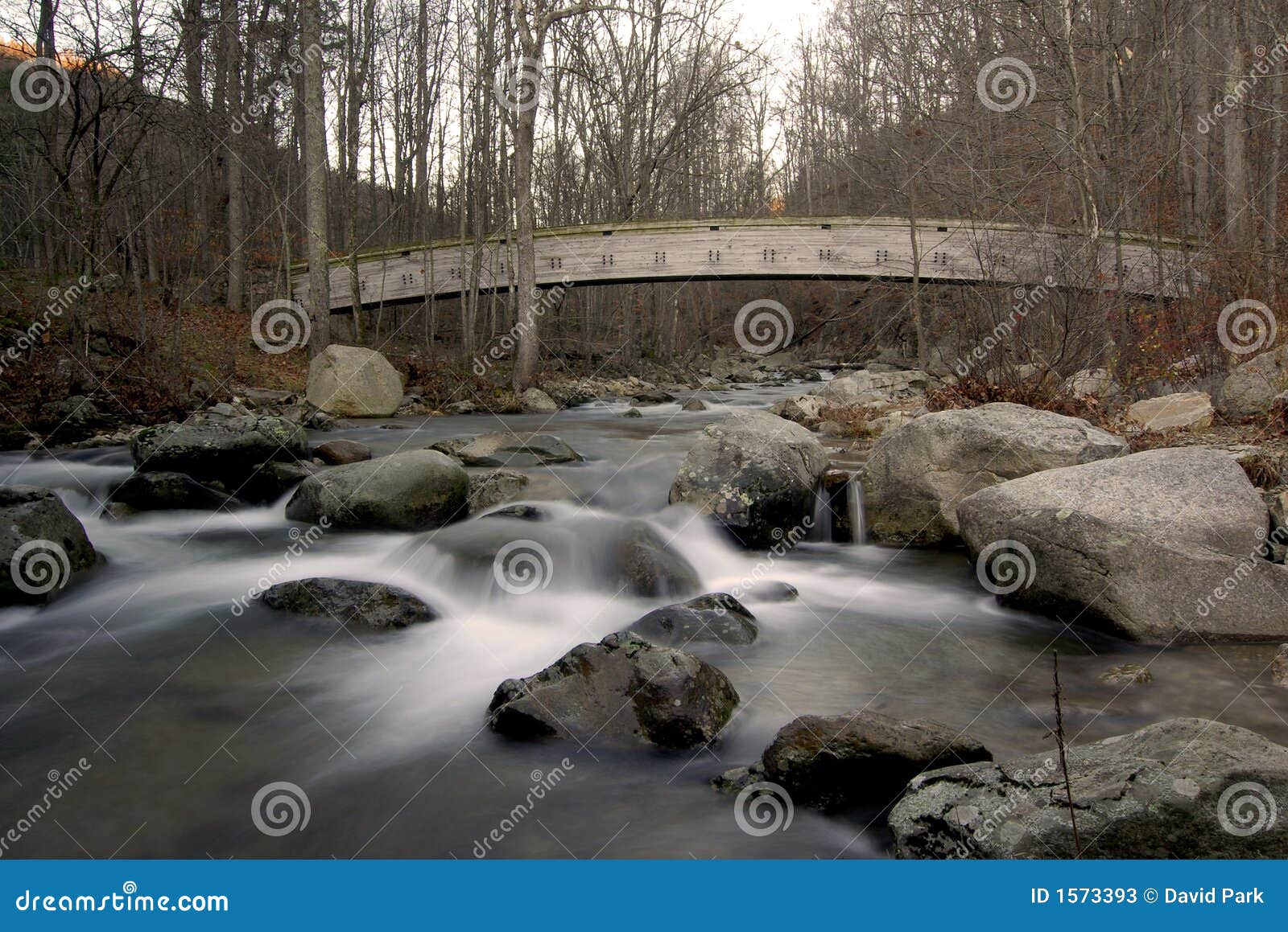 Wood Bridge Over Stream stock image. Image of brown, blur - 1573393