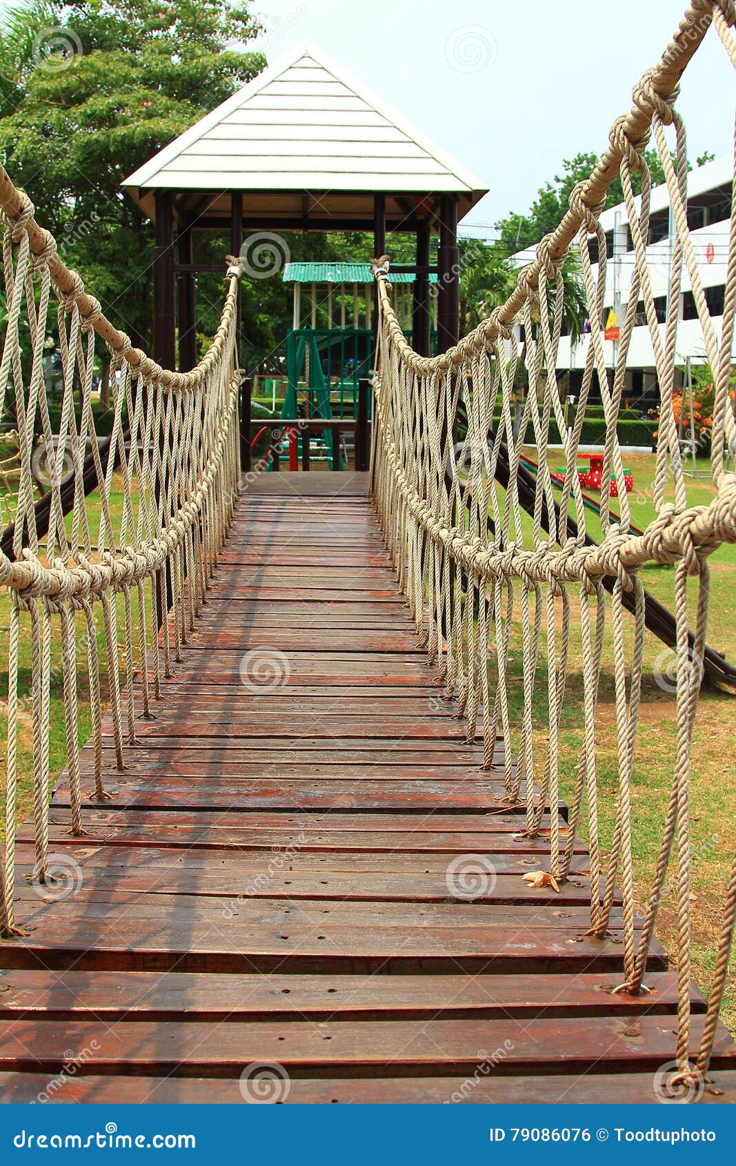 Wood bridge and rope stock photo. Image of structure - 79086076