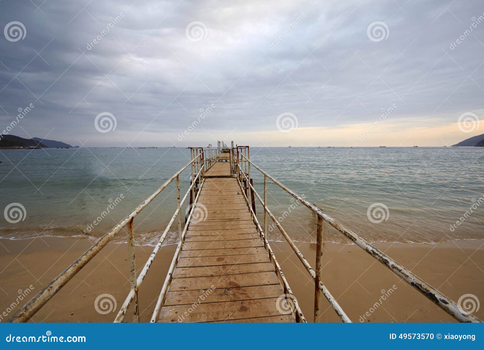 A wood bridge on the sea stock photo. Image of relax - 49573570