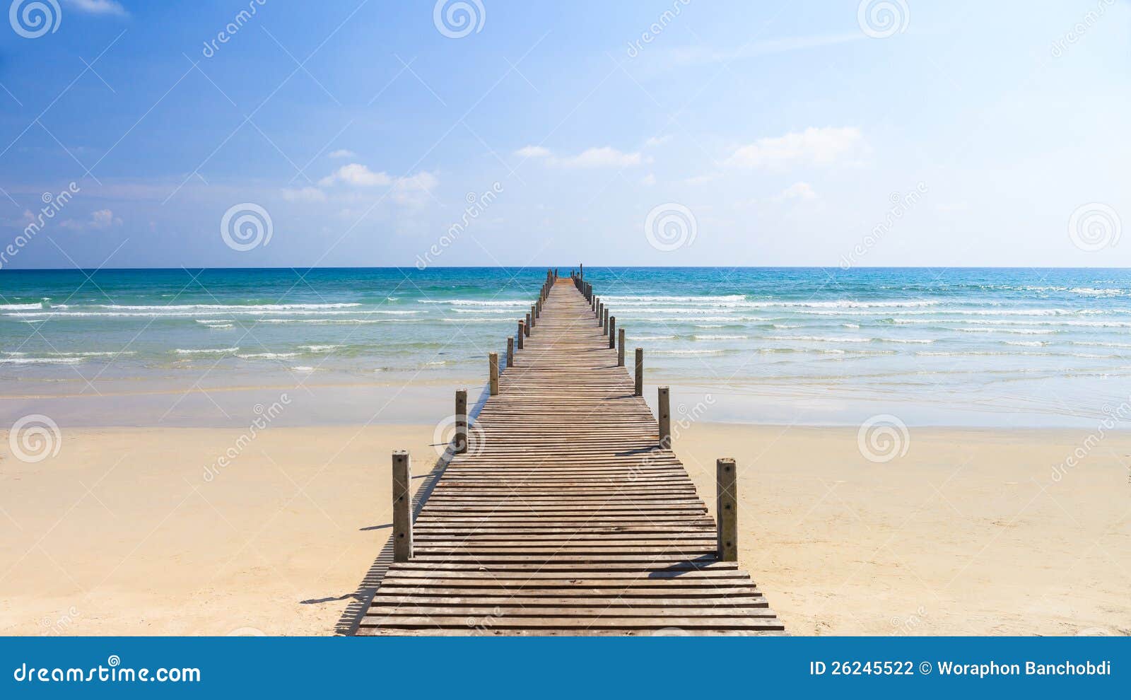 Wood bridge to the sea stock photo. Image of reflection - 26245522