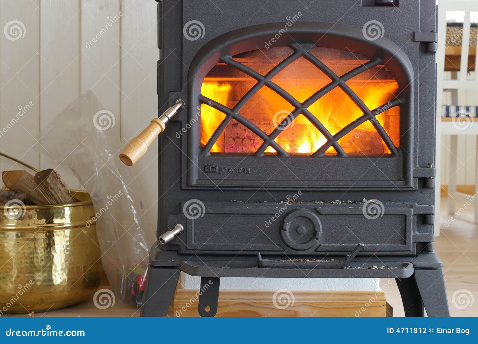Wood Burning Stove with Fire Stock Photo - Image of dusty, doors: 4711812