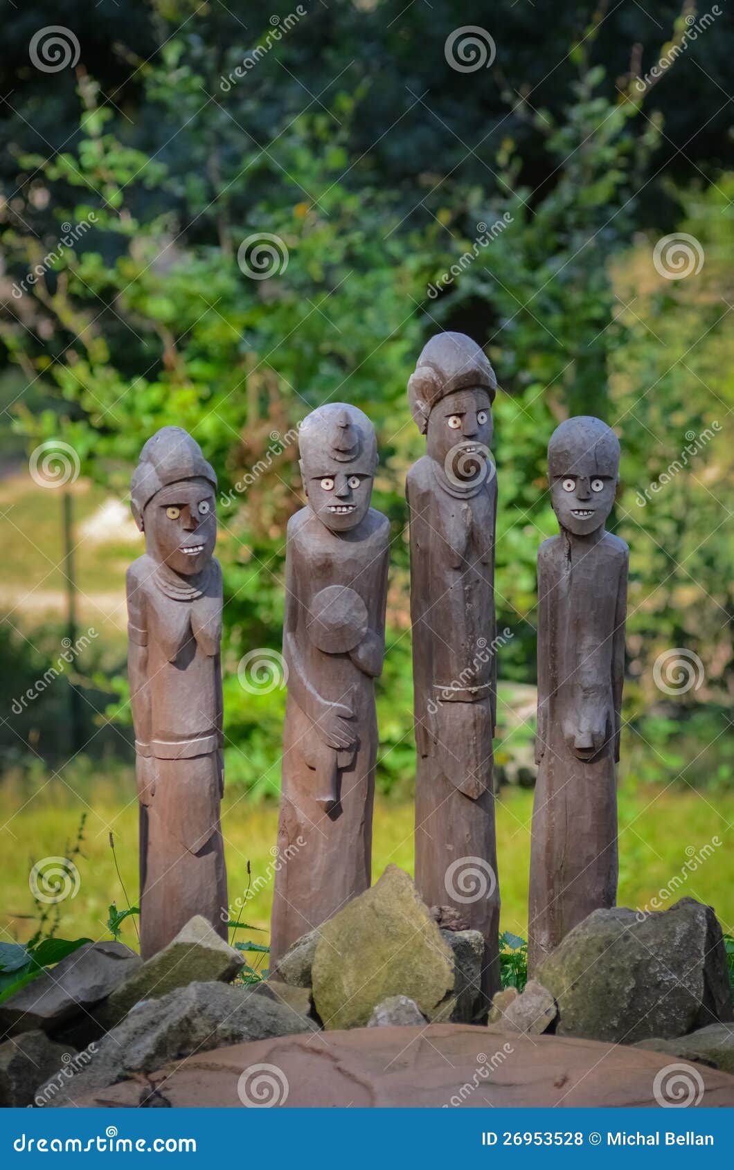 Wood Carving of Primitive Various African Men Stock Photo - Image of ...