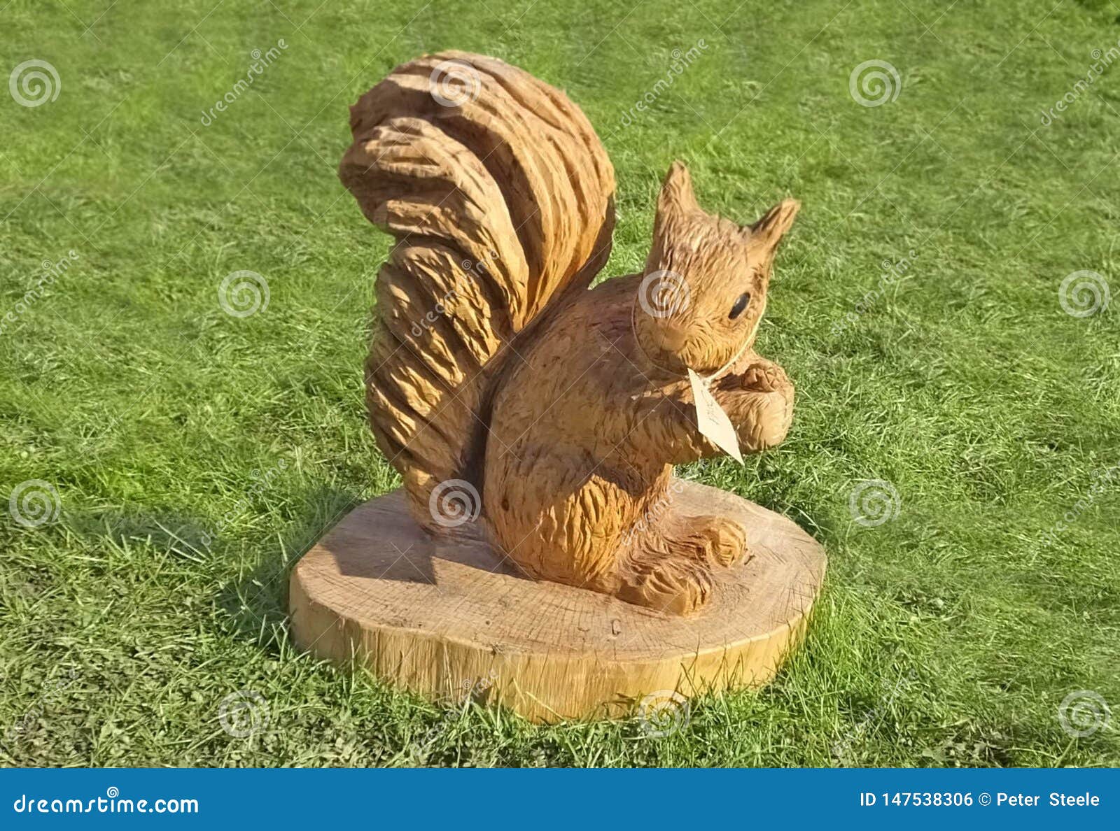 Wood Carving of a Squirrel with a Chainsaw, Hammers and Stock Photo ...
