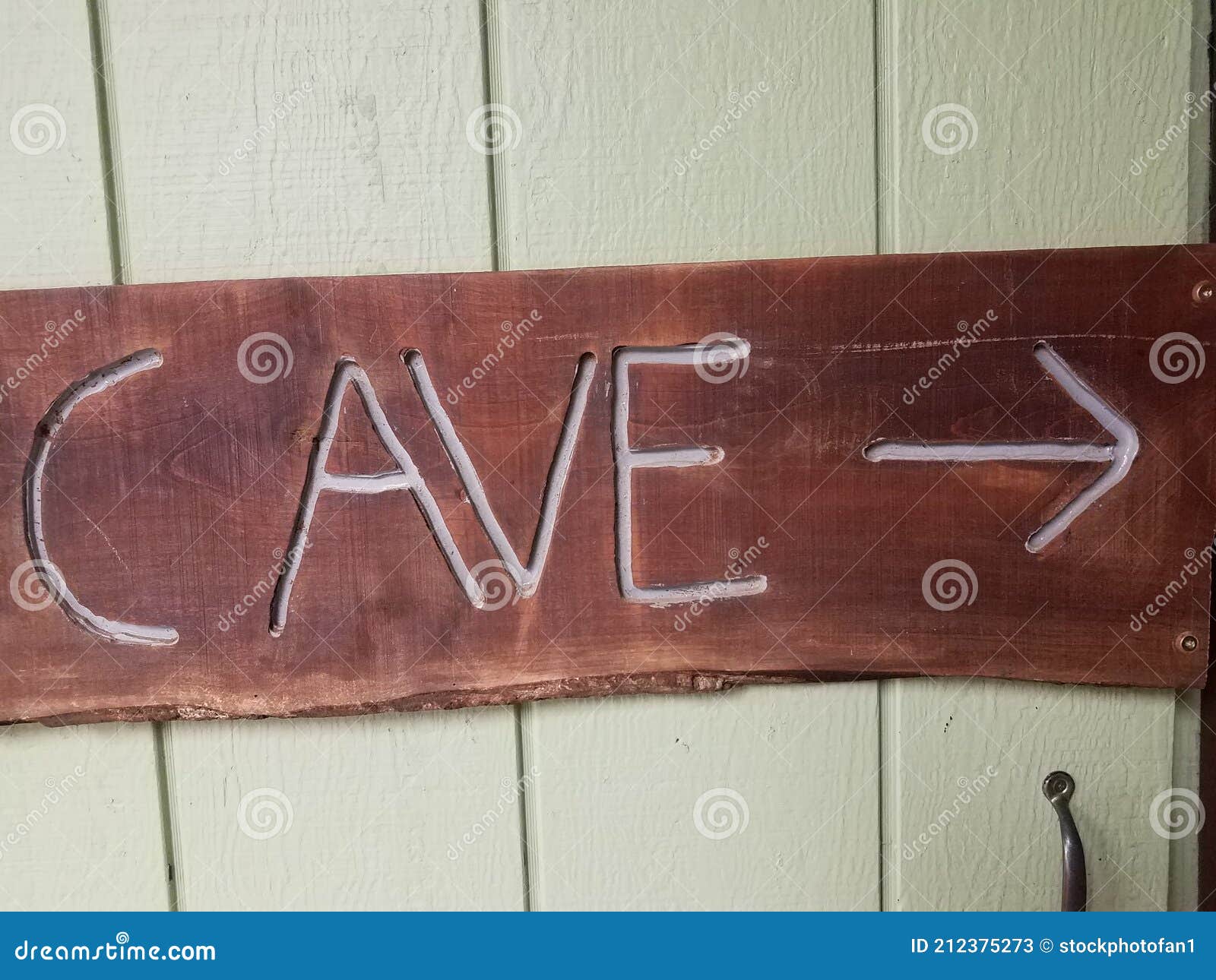 Wood Cave Sign on Door with Arrow Stock Image - Image of pointer, arrow ...