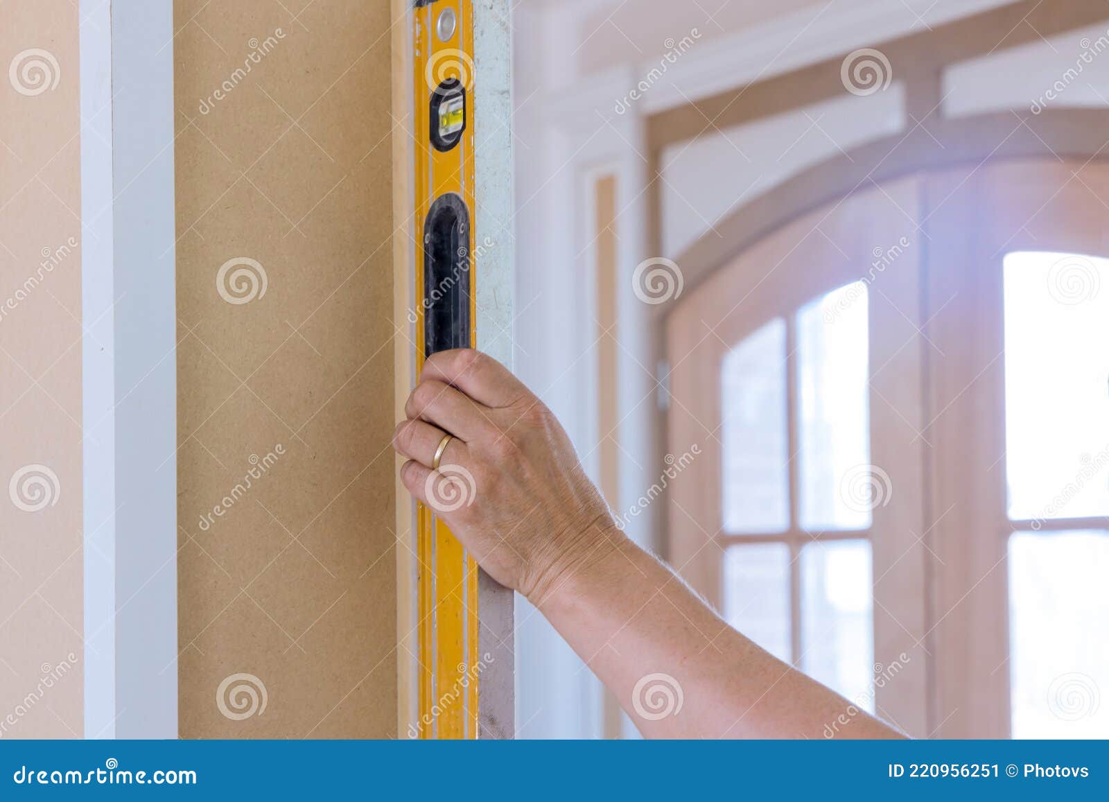 Wood Columns Using Level in Check Appropriate Under Construction in ...