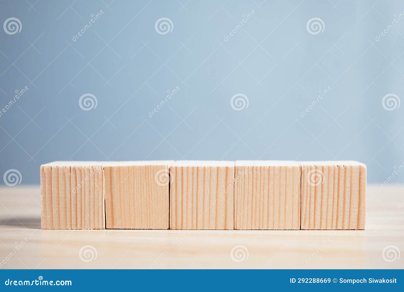 Wood Empty Five Blocks on Table and Blue Blackground with Copy Space ...