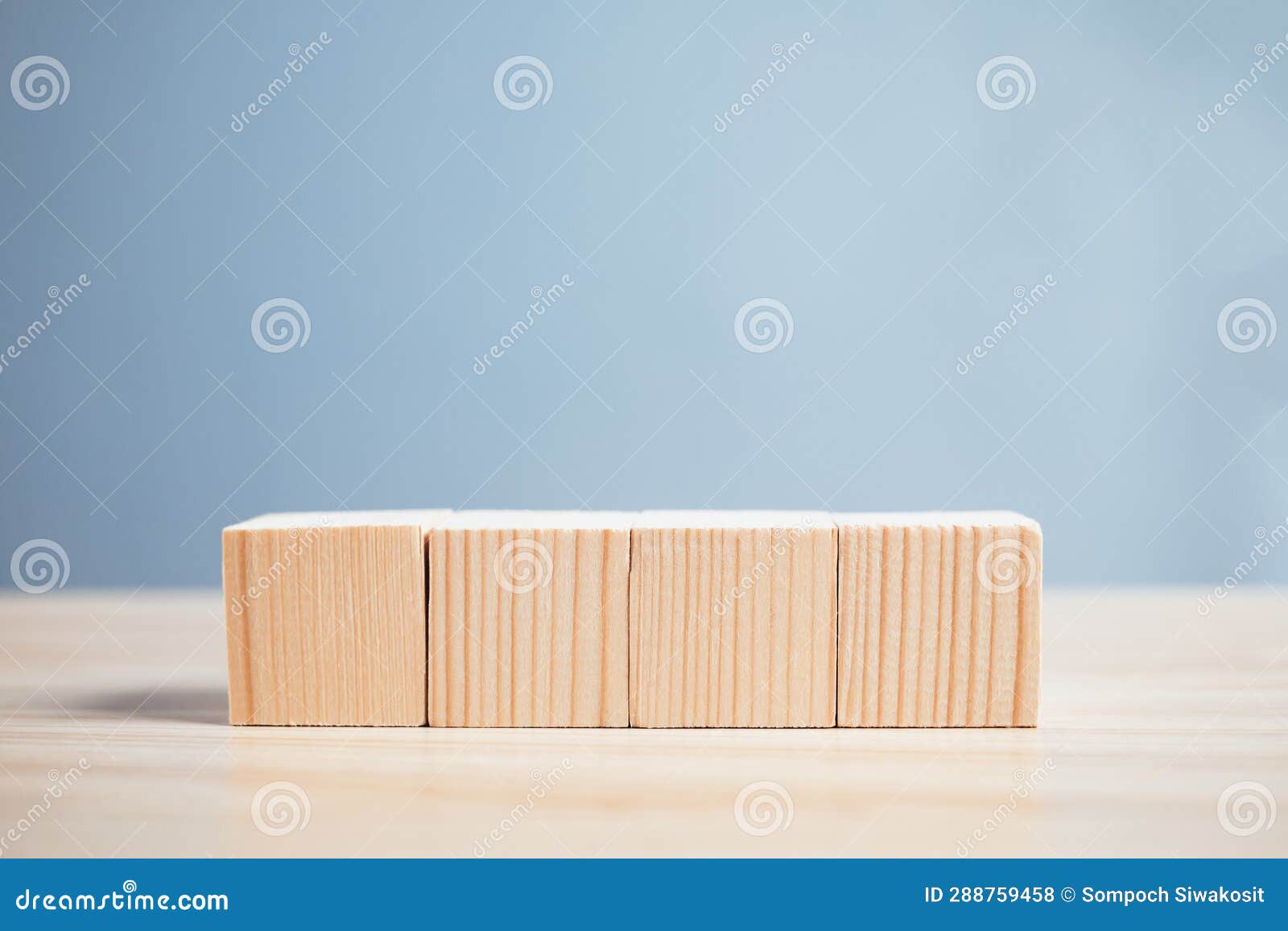 Wood Empty Four Blocks on Table and Blue Blackground with Copy Space ...