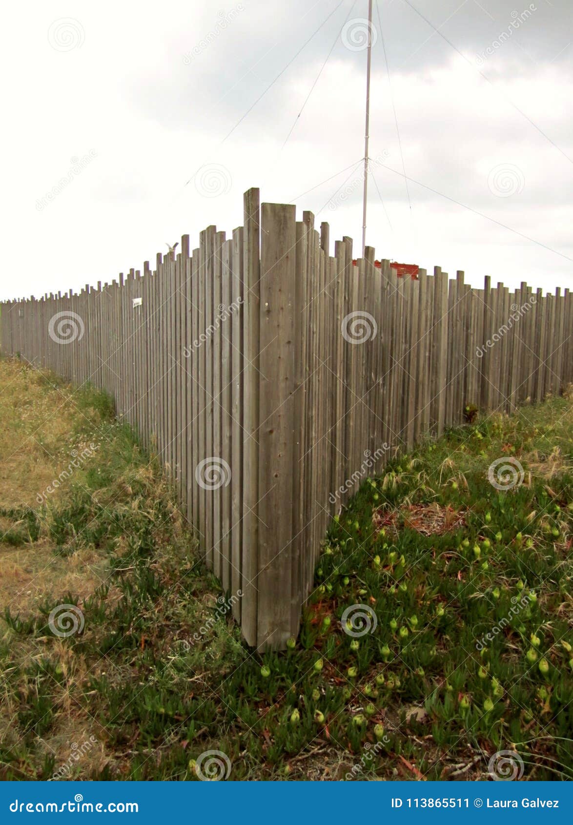 Wood Fence in a Triangular Shape in the Beach Stock Image - Image of ...
