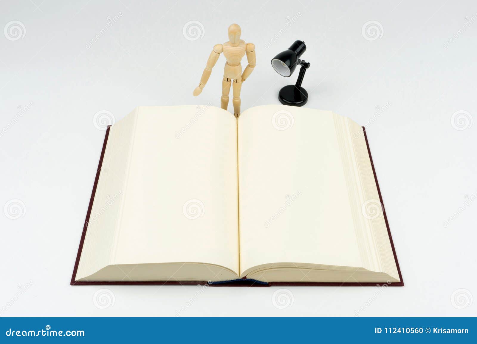 Wood Figure is Reading a Book Stock Photo - Image of figure, lamp ...