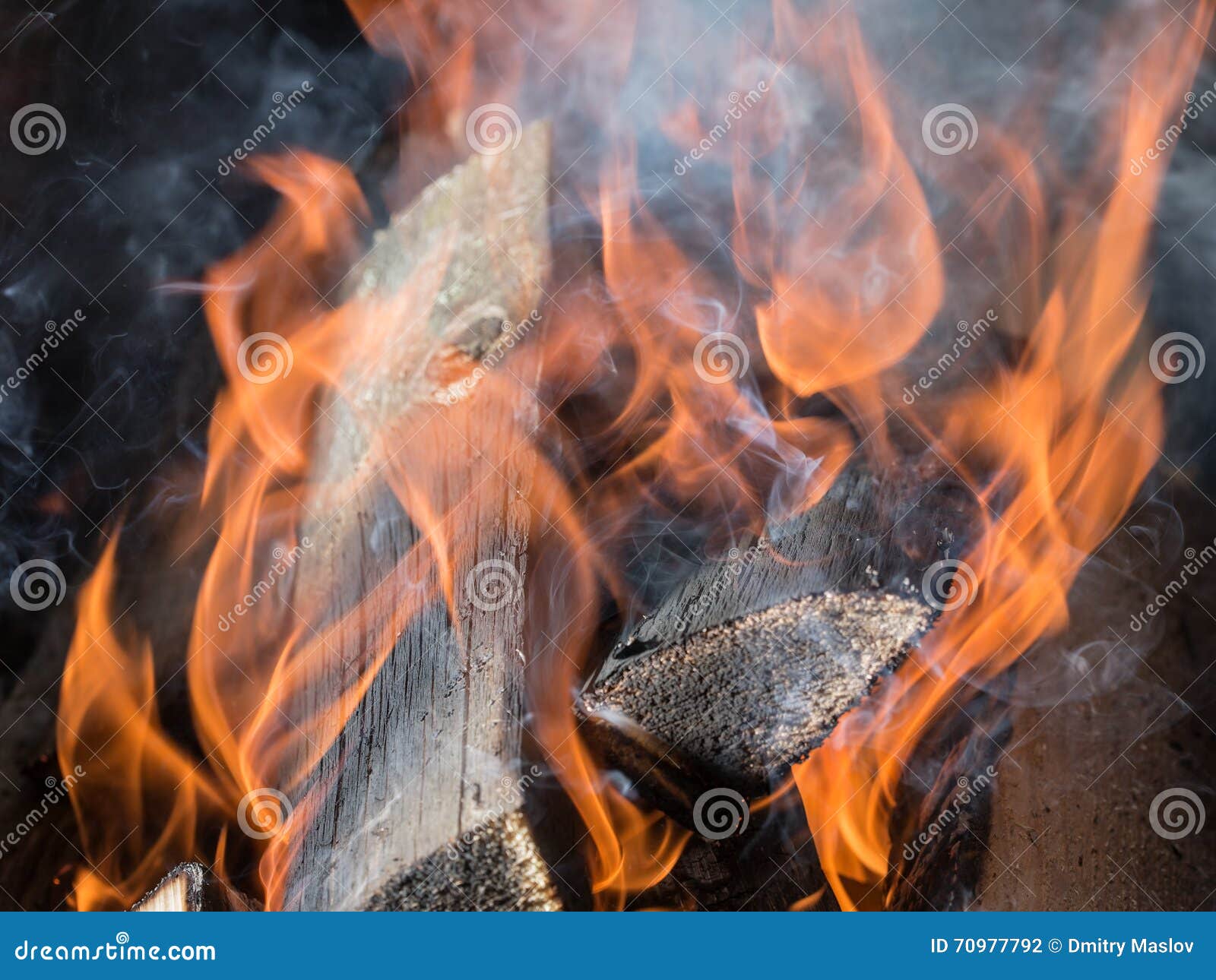 Wood in the fire close up stock photo. Image of smoke - 70977792