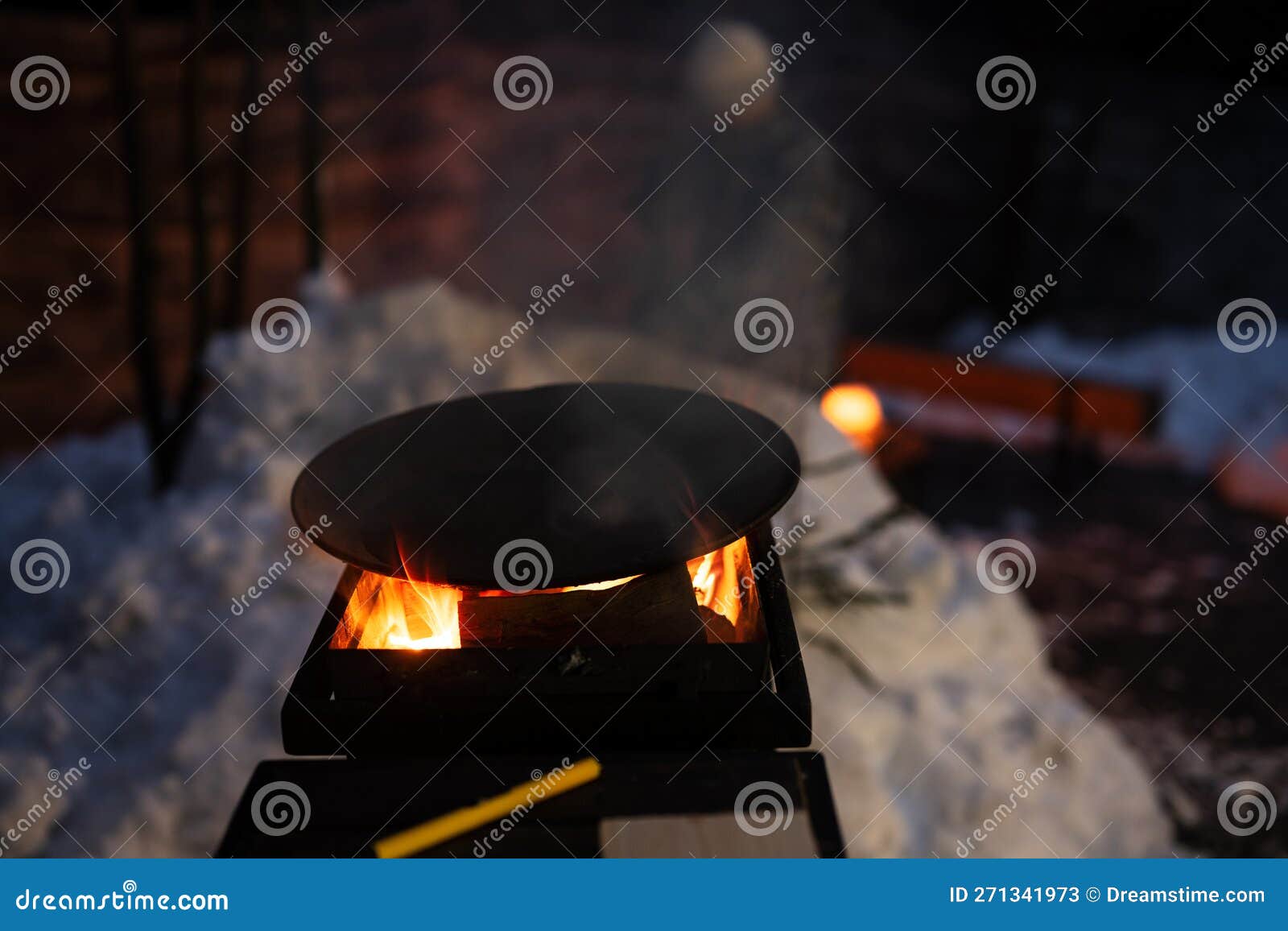 Wood Fired Barbecue with Brgiht Burning Flame at Evening Time Stock ...