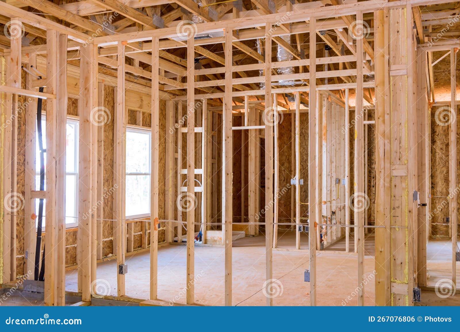 A Wood Frame Unfinished for Residential Construction is Framed by ...