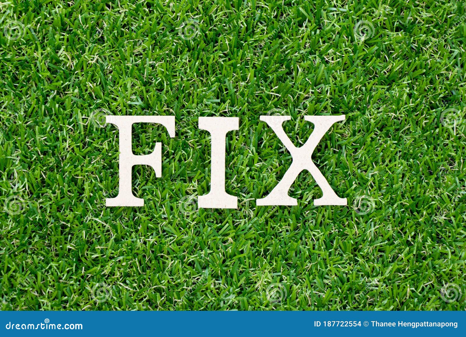 Wood Letter in Word Fix on Green Grass Background Stock Photo - Image ...