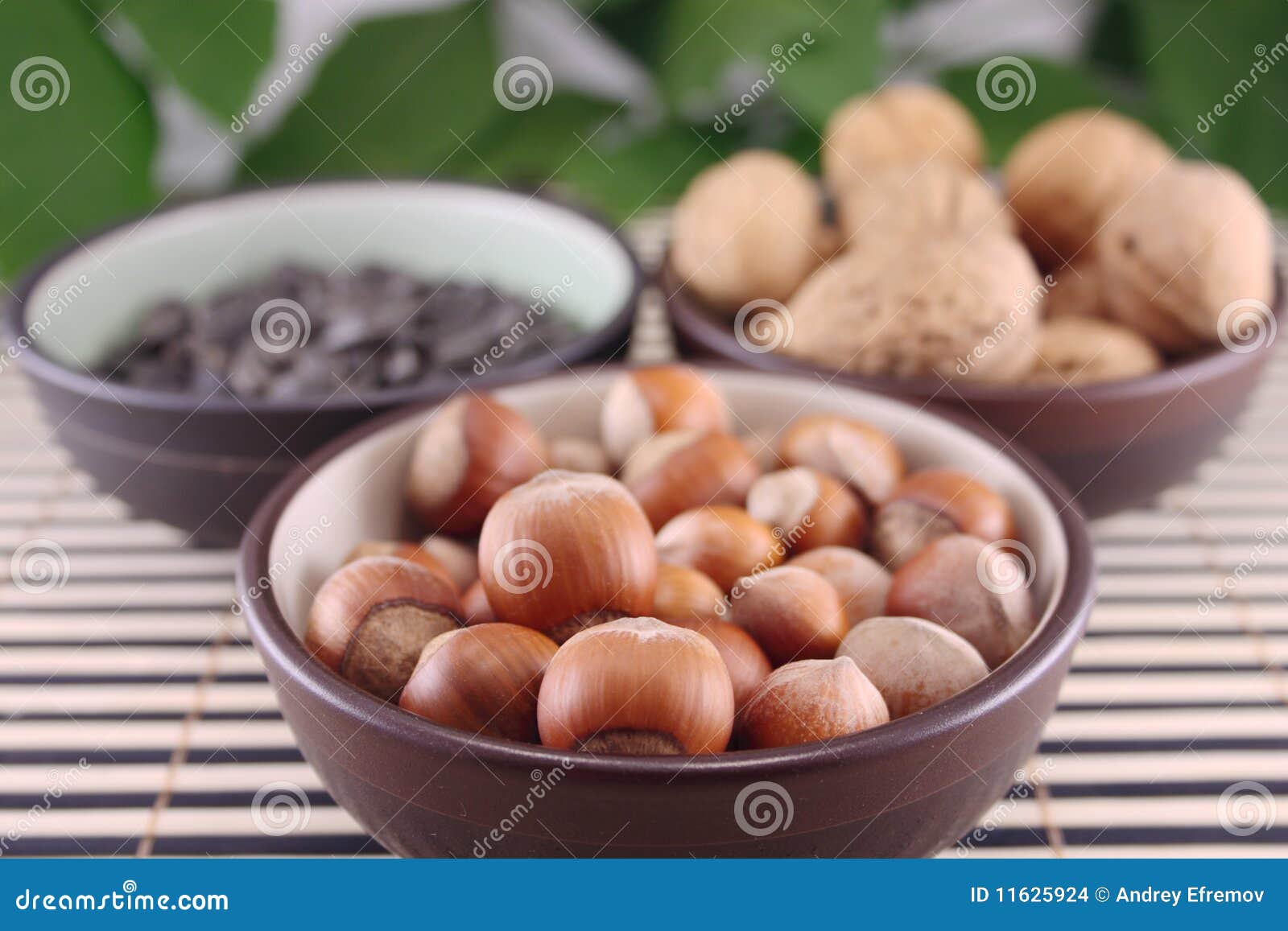Wood Nuts in Cup on Bamboo Napkin Stock Photo - Image of nuts, healthy ...