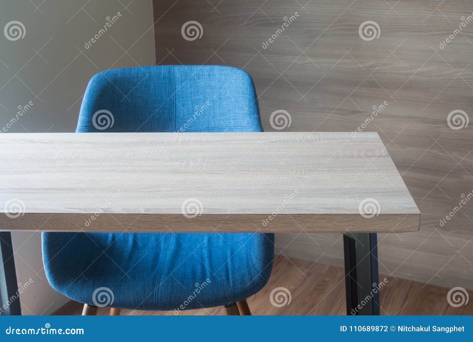 Wood Office Table with Blue Chair on Wood Wall Background Texture at ...