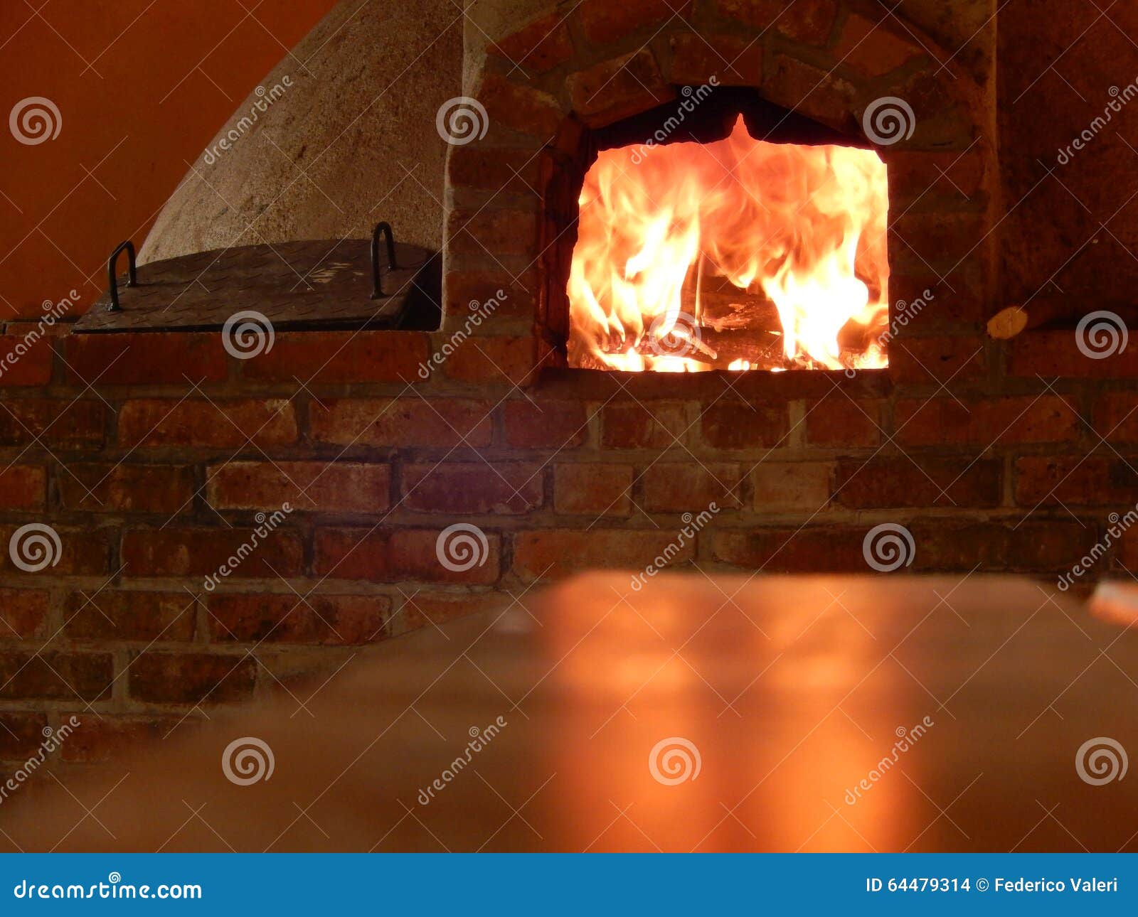 Wood Oven Fire Reflecting on Table Stock Photo - Image of travel, table ...