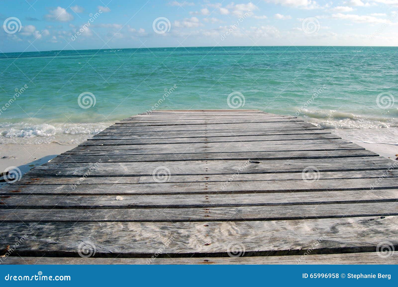 Wood path on the beach stock photo. Image of ocean, perspective - 65996958